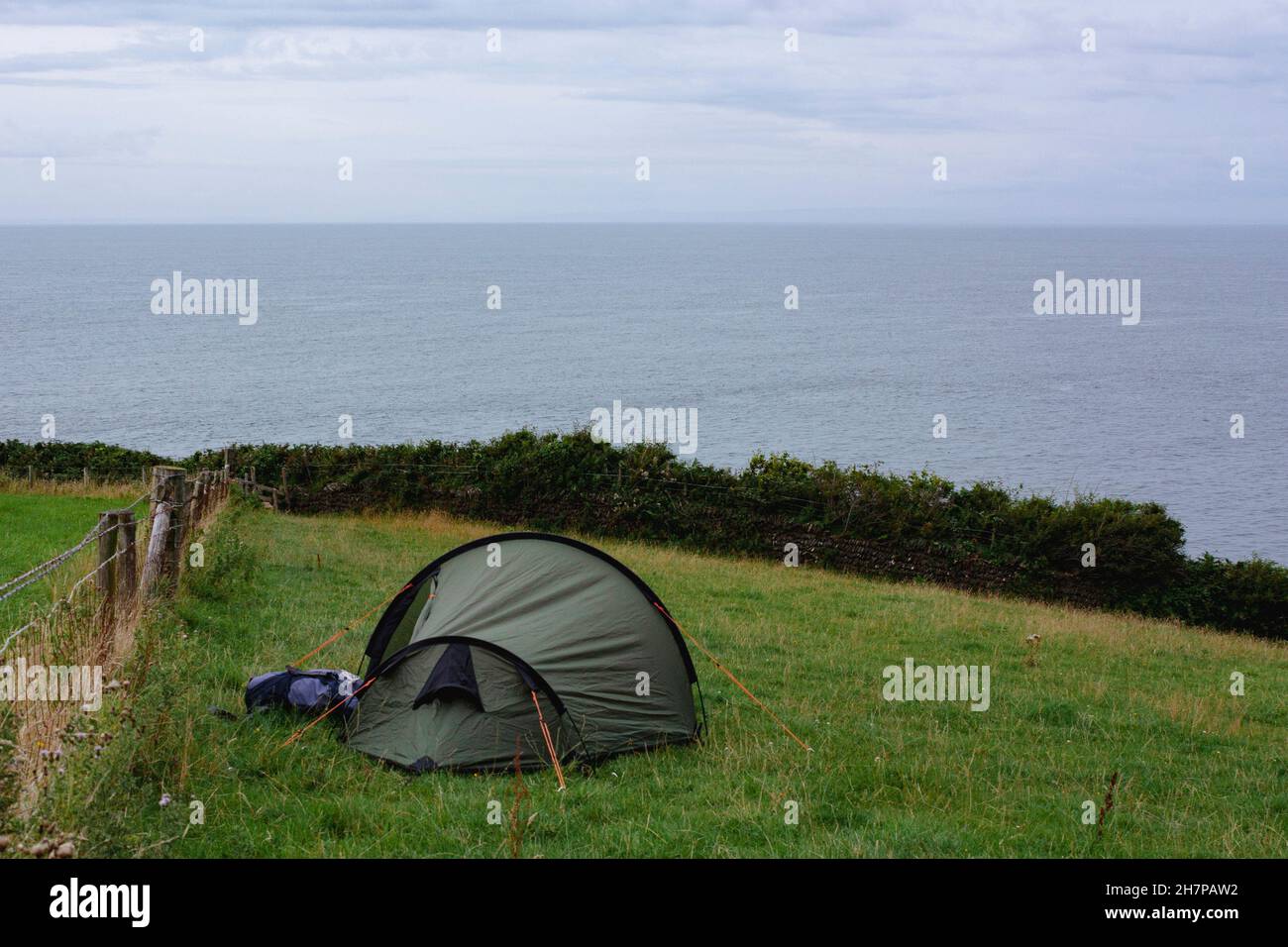 Hiker's tent pitched on Crock Point, north Devon Stock Photo - Alamy