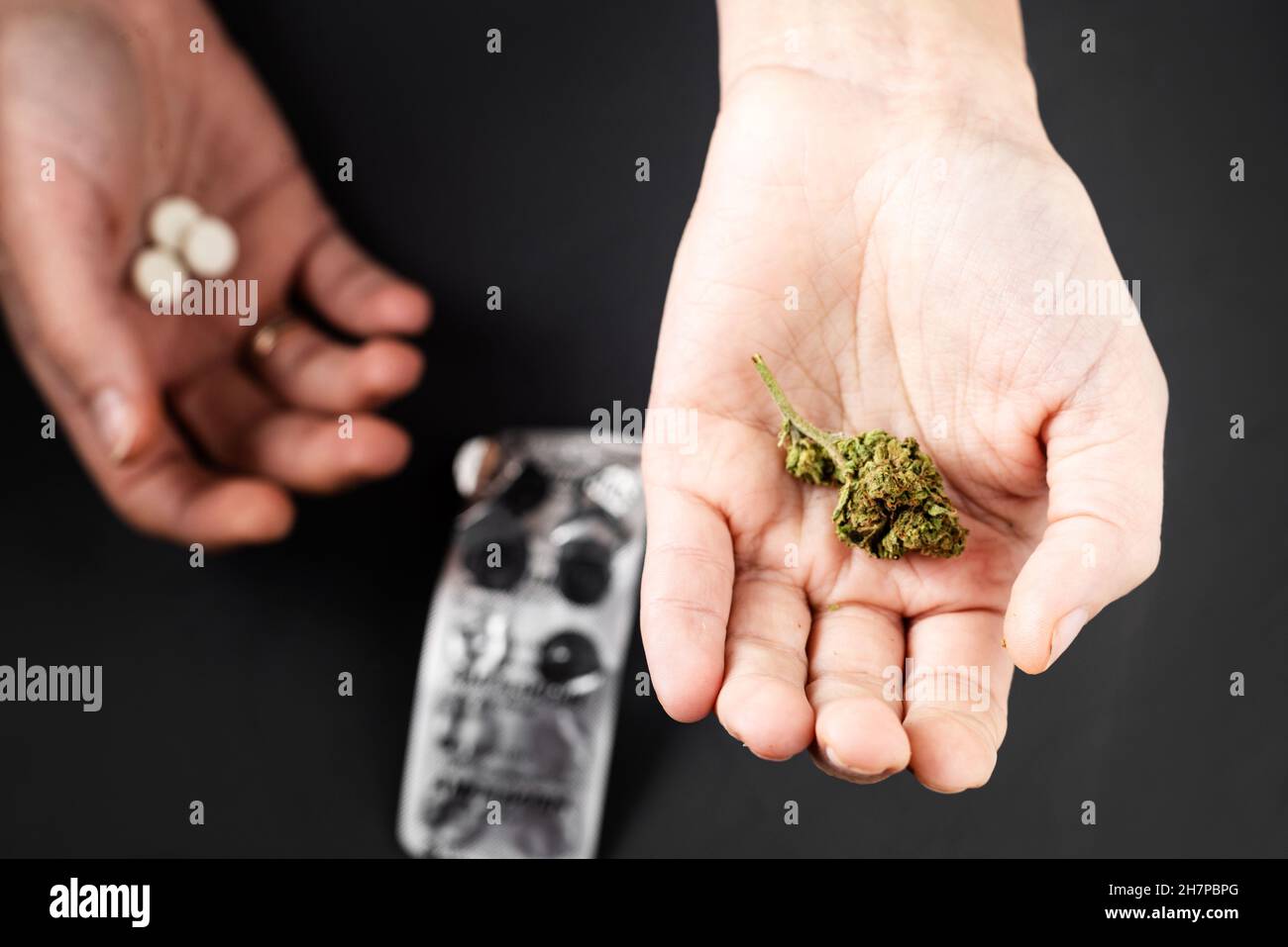 Medical cannabis as an alternative to drugs concept. Marijuana bud on a ...