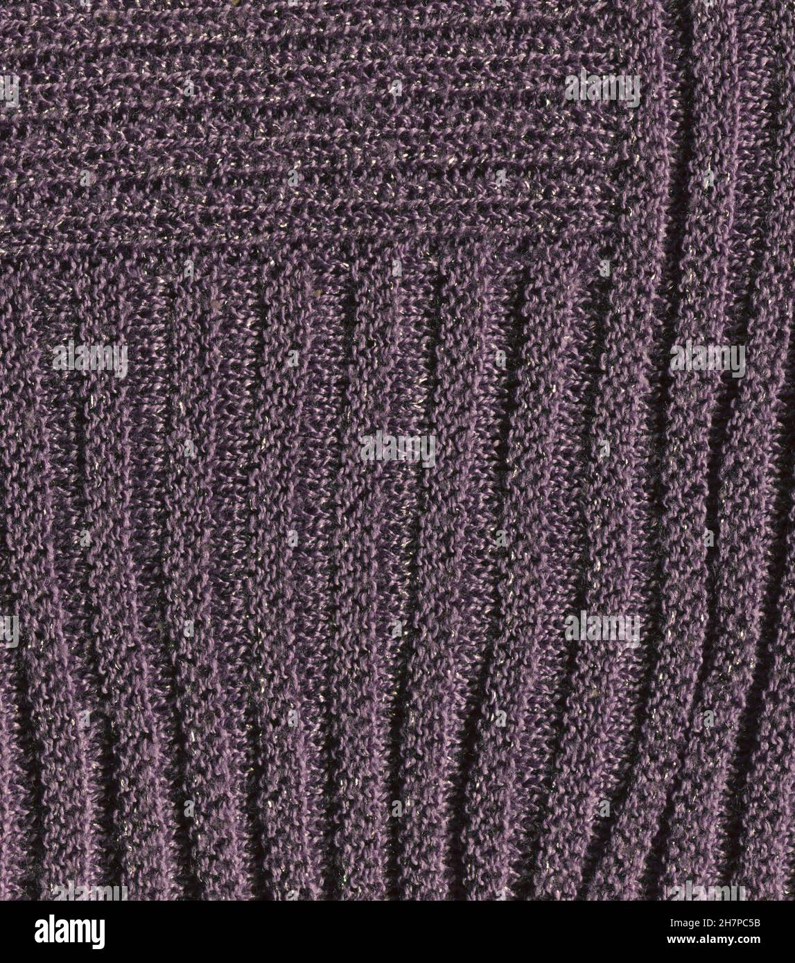 Sandy colored cozy sweater knitted made of natural wool texture. Warm ...