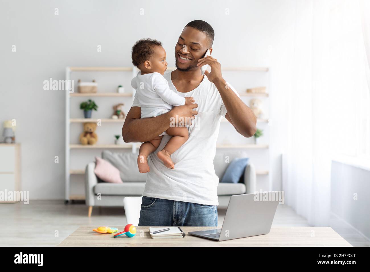 Man multitasking child hi-res stock photography and images - Alamy