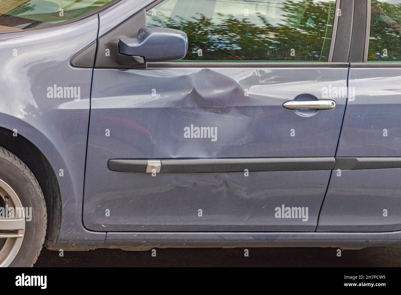 Bent Car Front Door Metal Damage Accident Stock Photo - Alamy