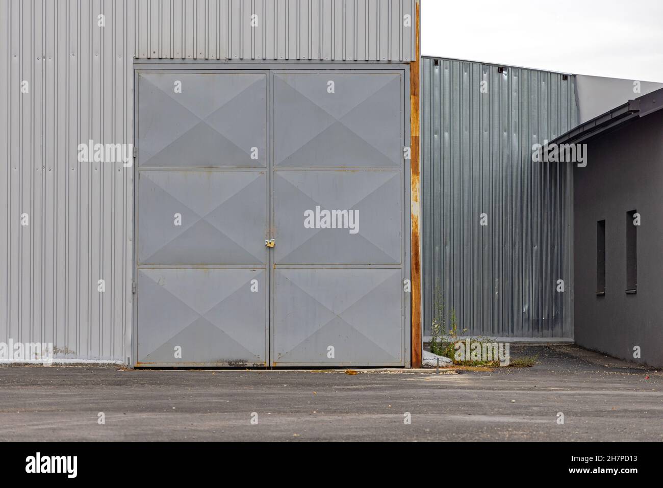 Padlock at Closed Double Doors Warehouse Storage Building Stock Photo ...