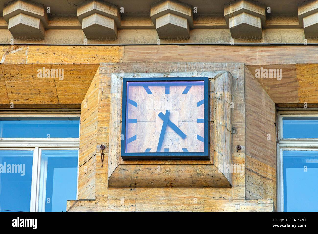 Square Public Clock at Marbe Building Facade Stock Photo - Alamy