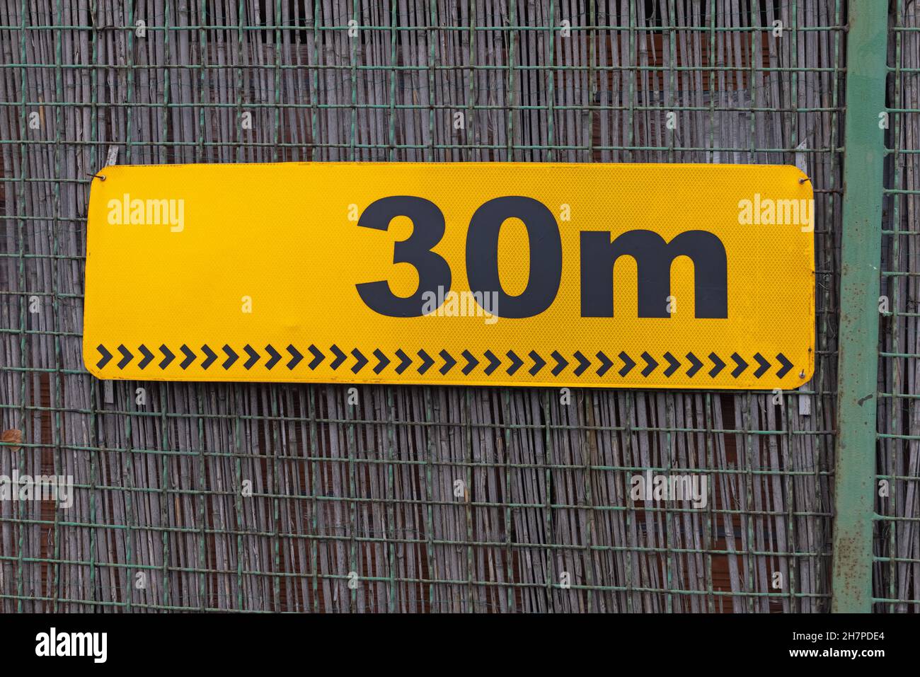Thirty Meters Yellow Reflective Sign Arrows Stock Photo - Alamy