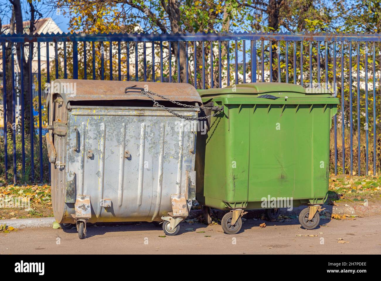 Two Dumpster Bins Chained to Each Other Recycling Stock Photo - Alamy