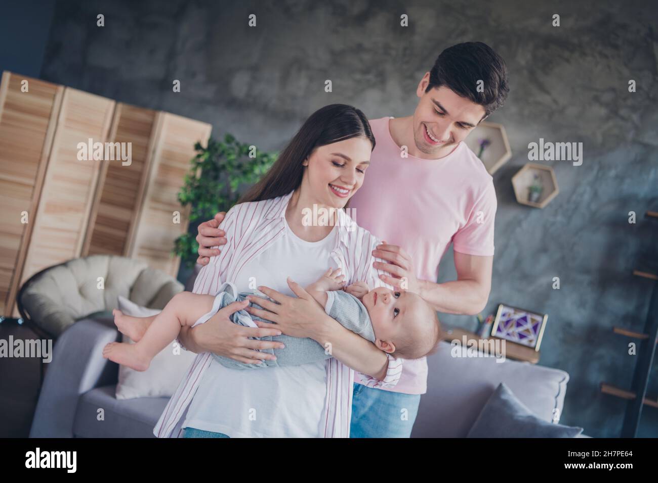 Wife rocking her baby hi-res stock photography and images - Alamy