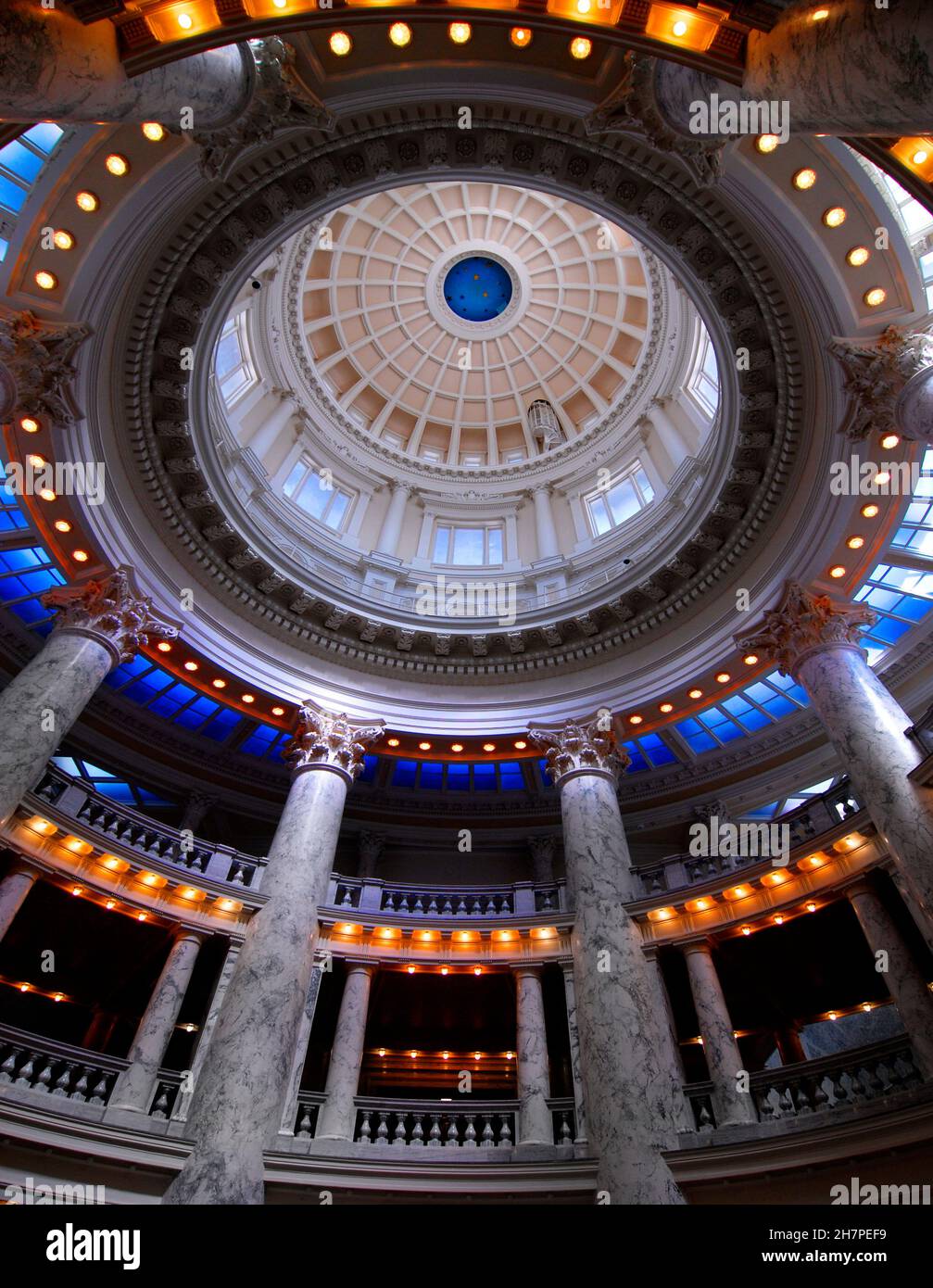 Inside looking up at columns and dome in Capitol State Capital building ...