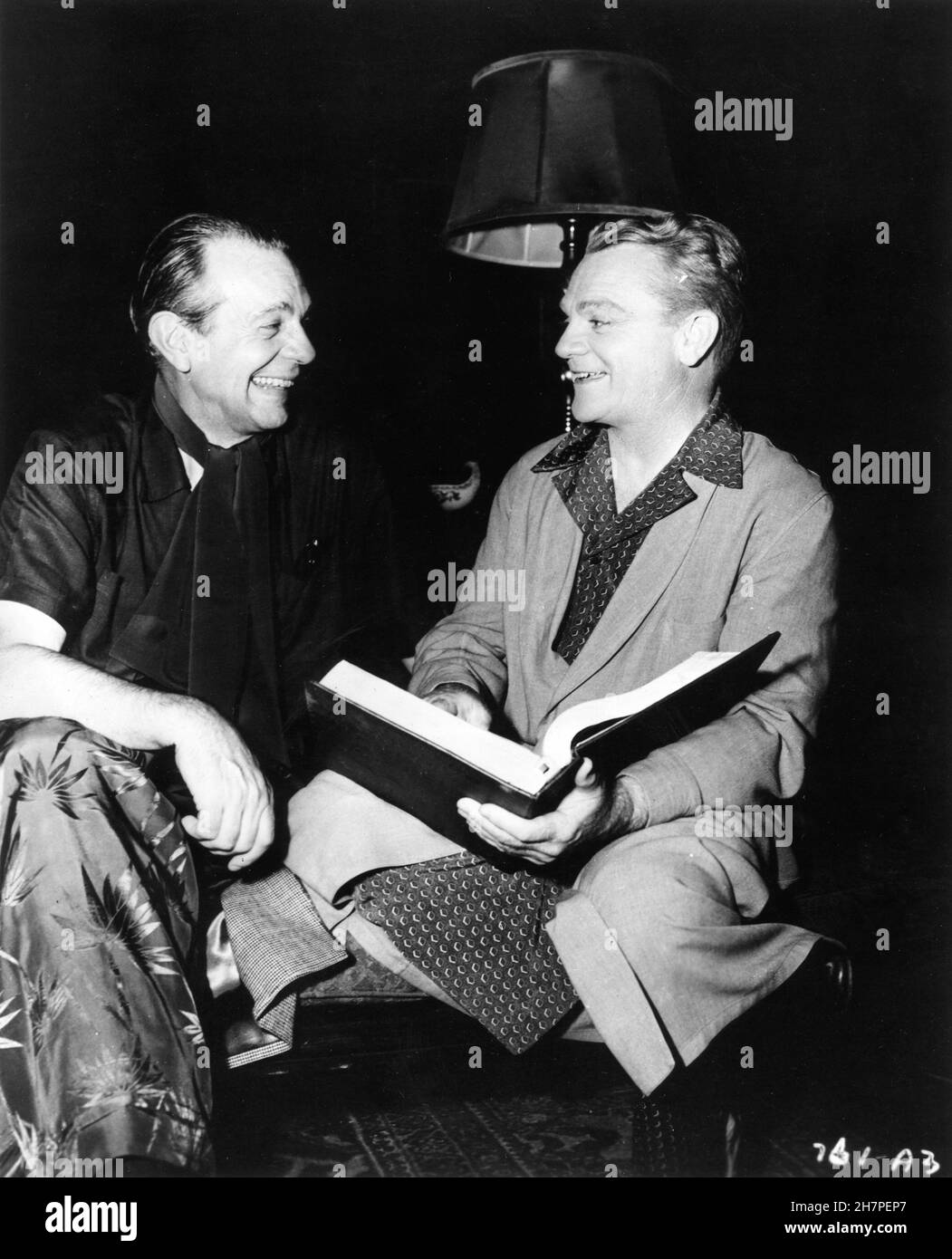 RAYMOND MASSEY and JAMES CAGNEY on set candid during filming of COME ...