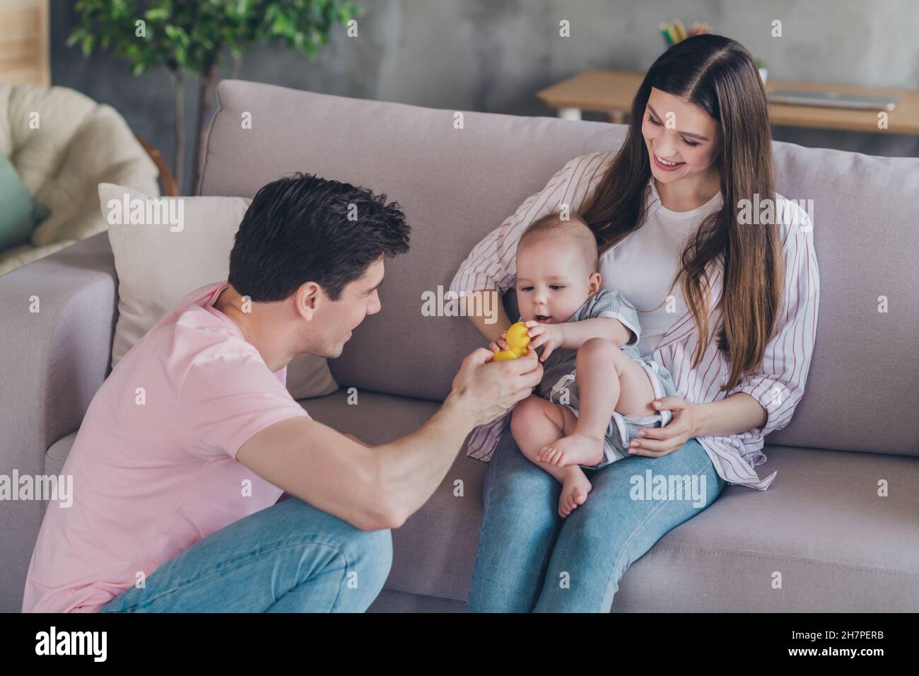 Father take child toy hi-res stock photography and images - Alamy