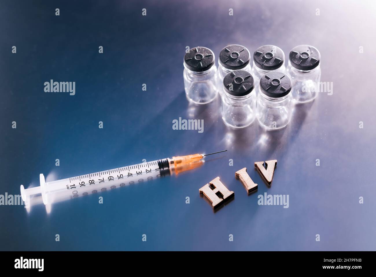 New AIDS treatment, vaccination with syringe with new vaccine, letters ...