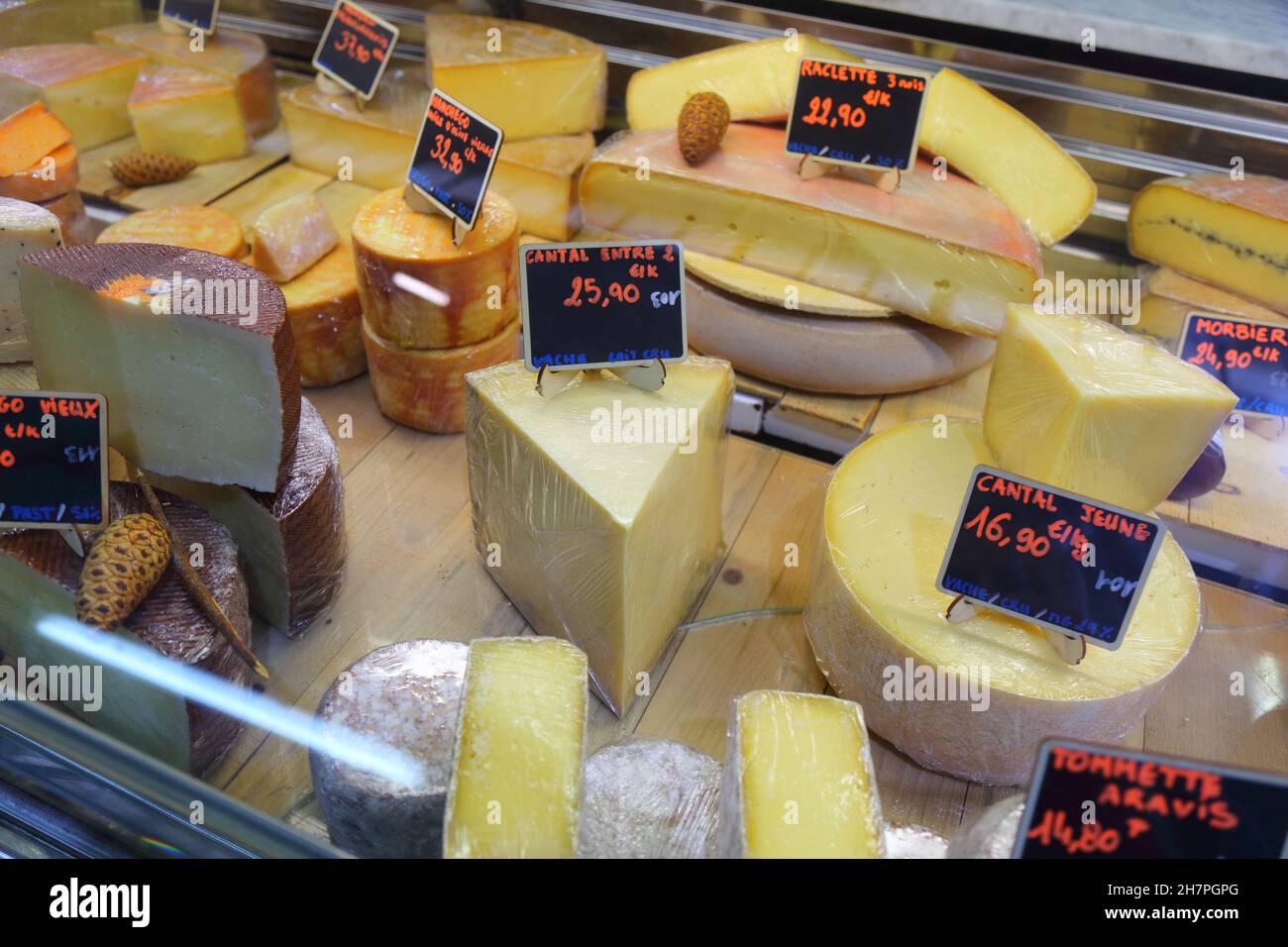 Cheese store in covered market of Beziers, France. Generic French ...
