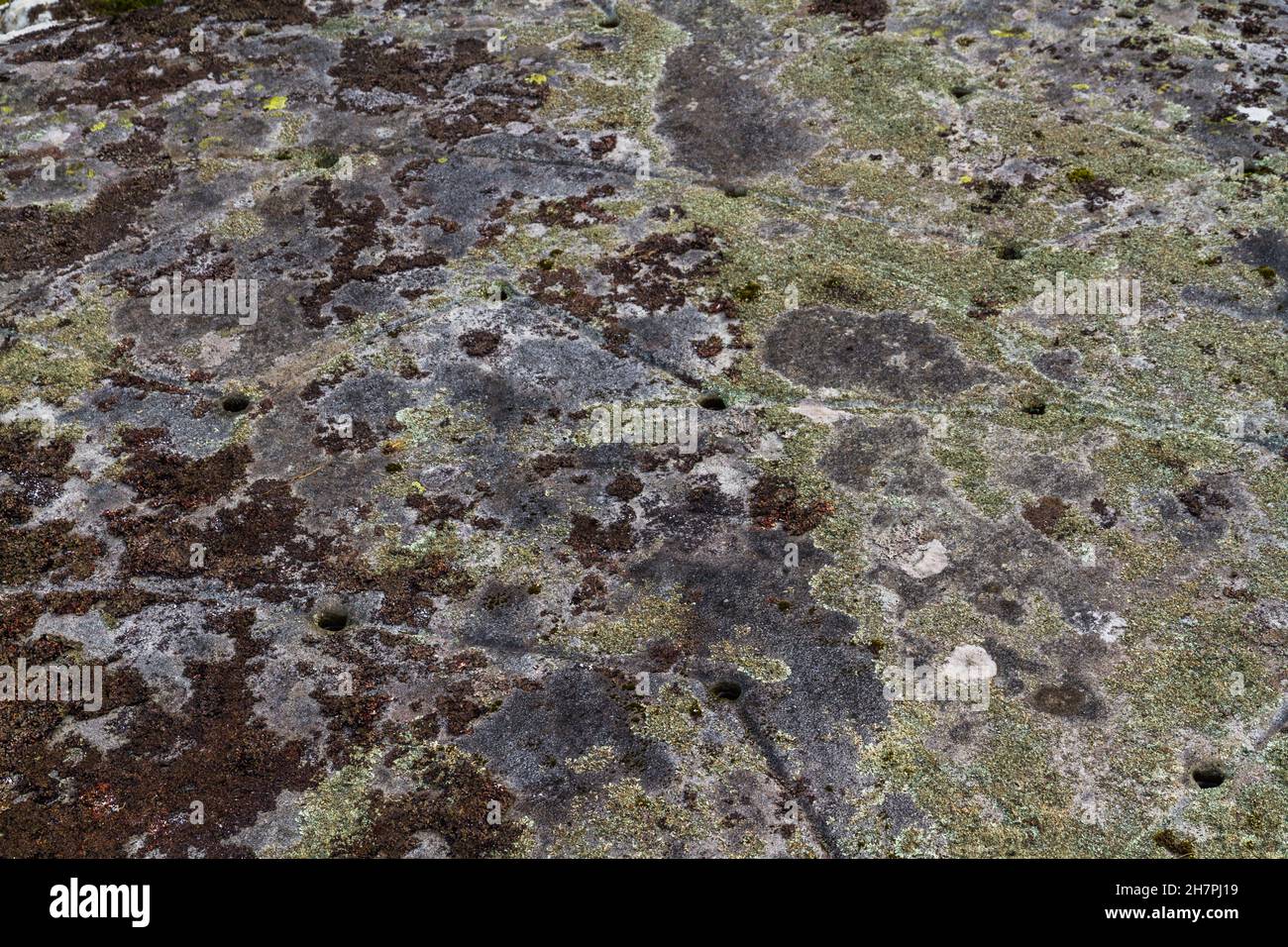 North Wales Rock Cannon, holes in rock or boulder. Gun powder used to ...