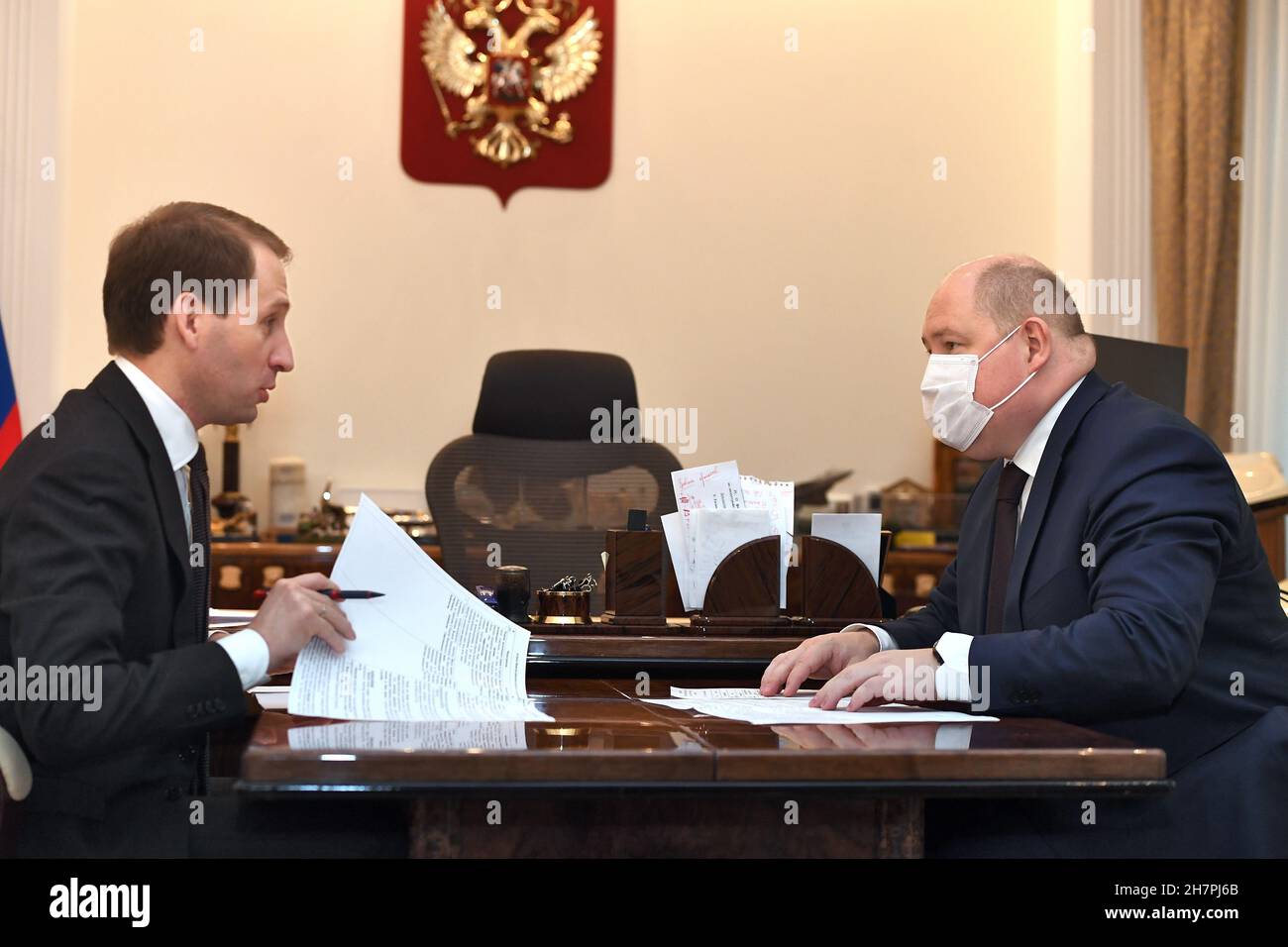 Russian Minister of Natural Resources and Environment Alexander Kozlov (left) and Governor of ...