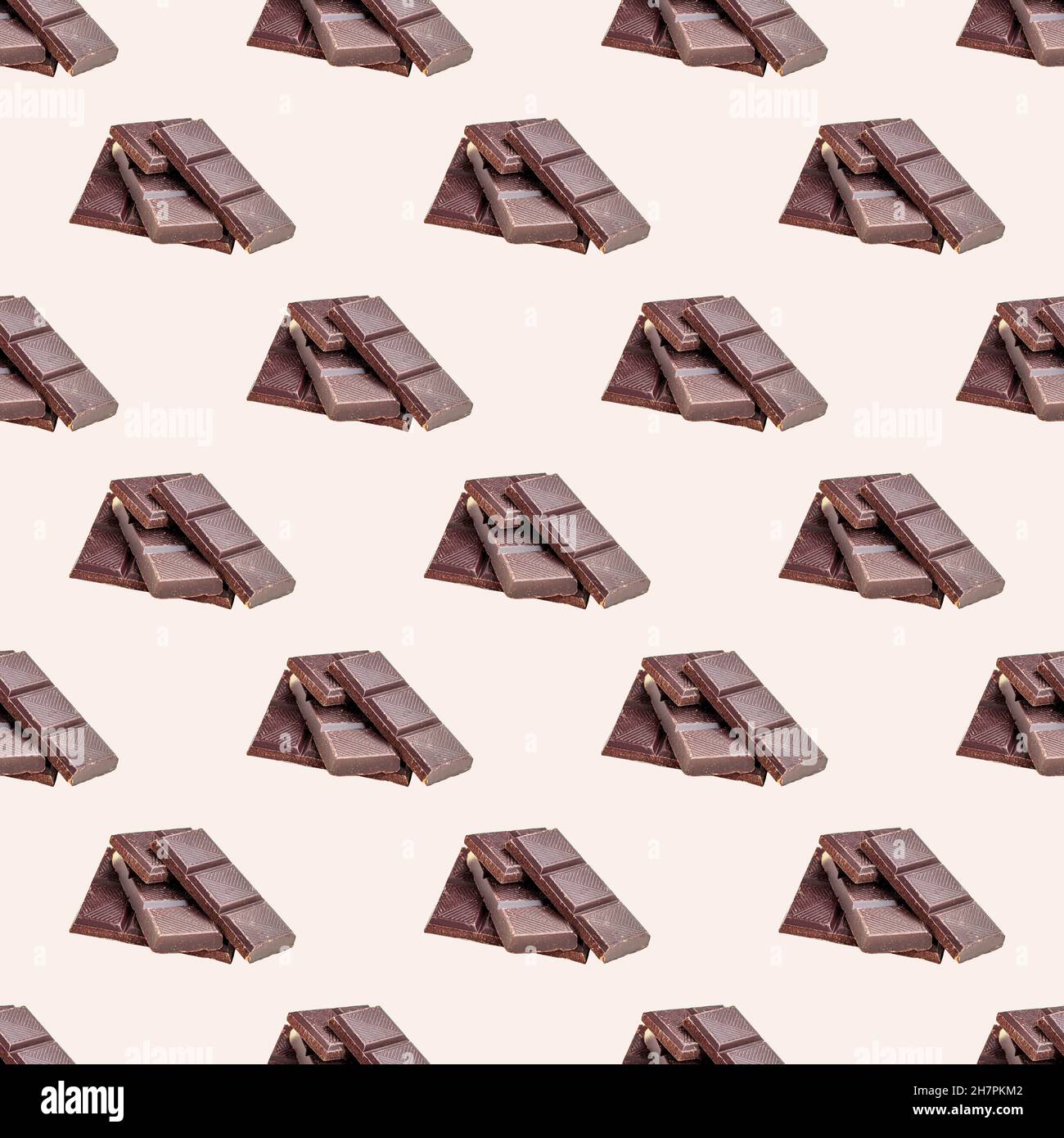 Sweet dark chocolate pieces repeat seamless pattern on light background ...