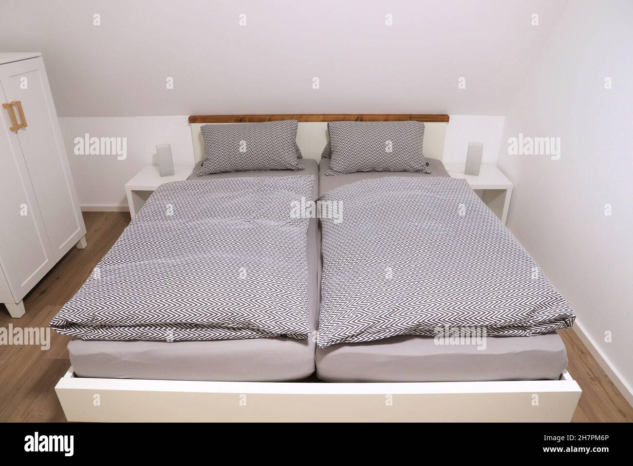 Small modern white bedroom. Photo of generic cozy bedroom Stock Photo ...