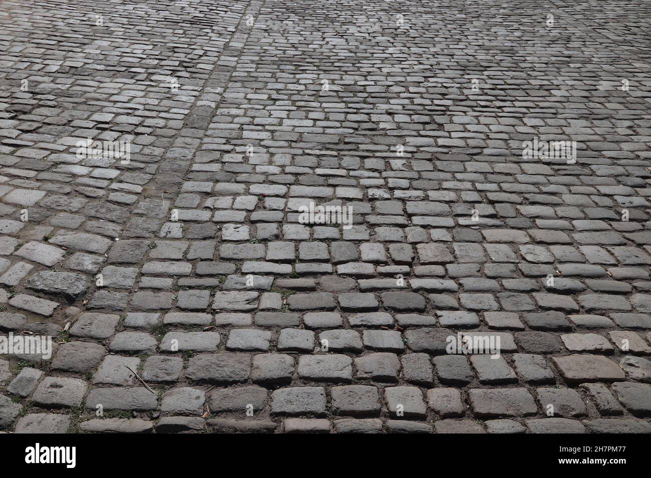 Stone paved street. Medieval stone pavement. Cobblestone in Germany ...