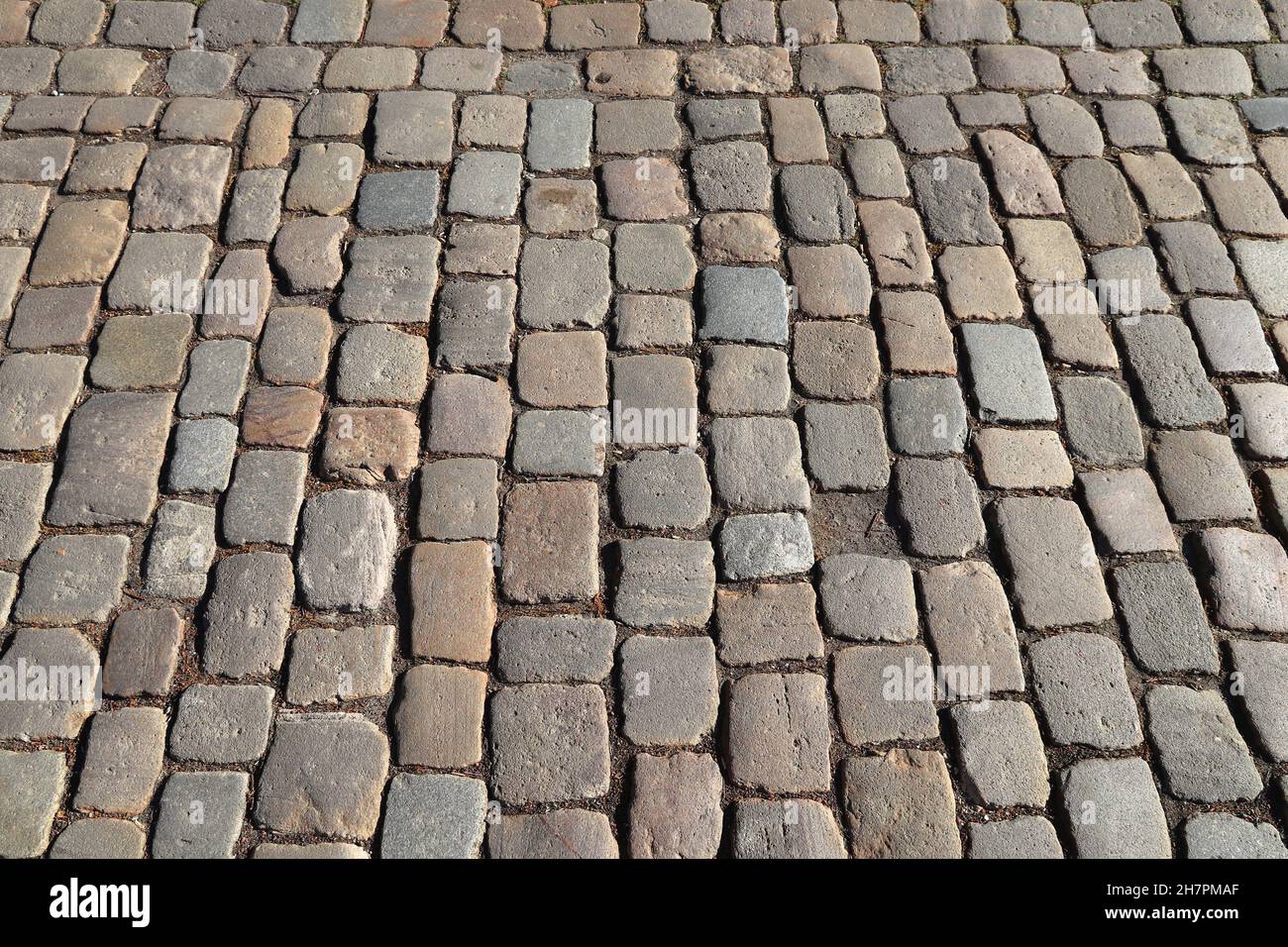 Stone paved street. Medieval stone pavement. Cobblestone in Europe ...