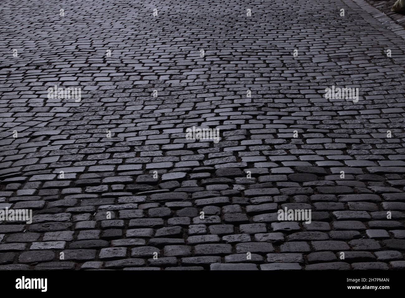 Night cobblestone street in Germany. Cobblestone Europe. Stone paved ...