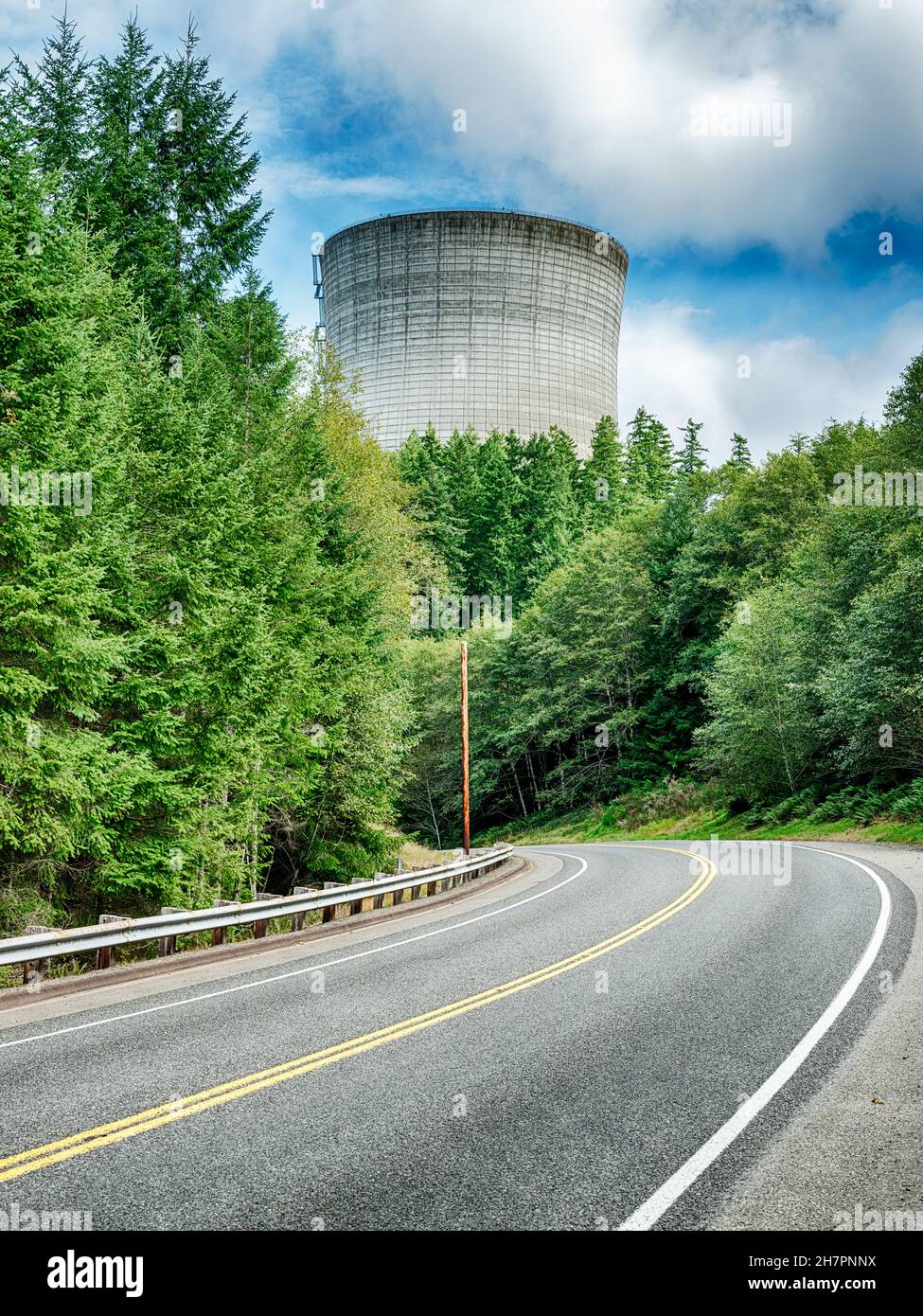 A highway leads to one of the large cooling towers at the WPPS nuclear reactor facility near ...