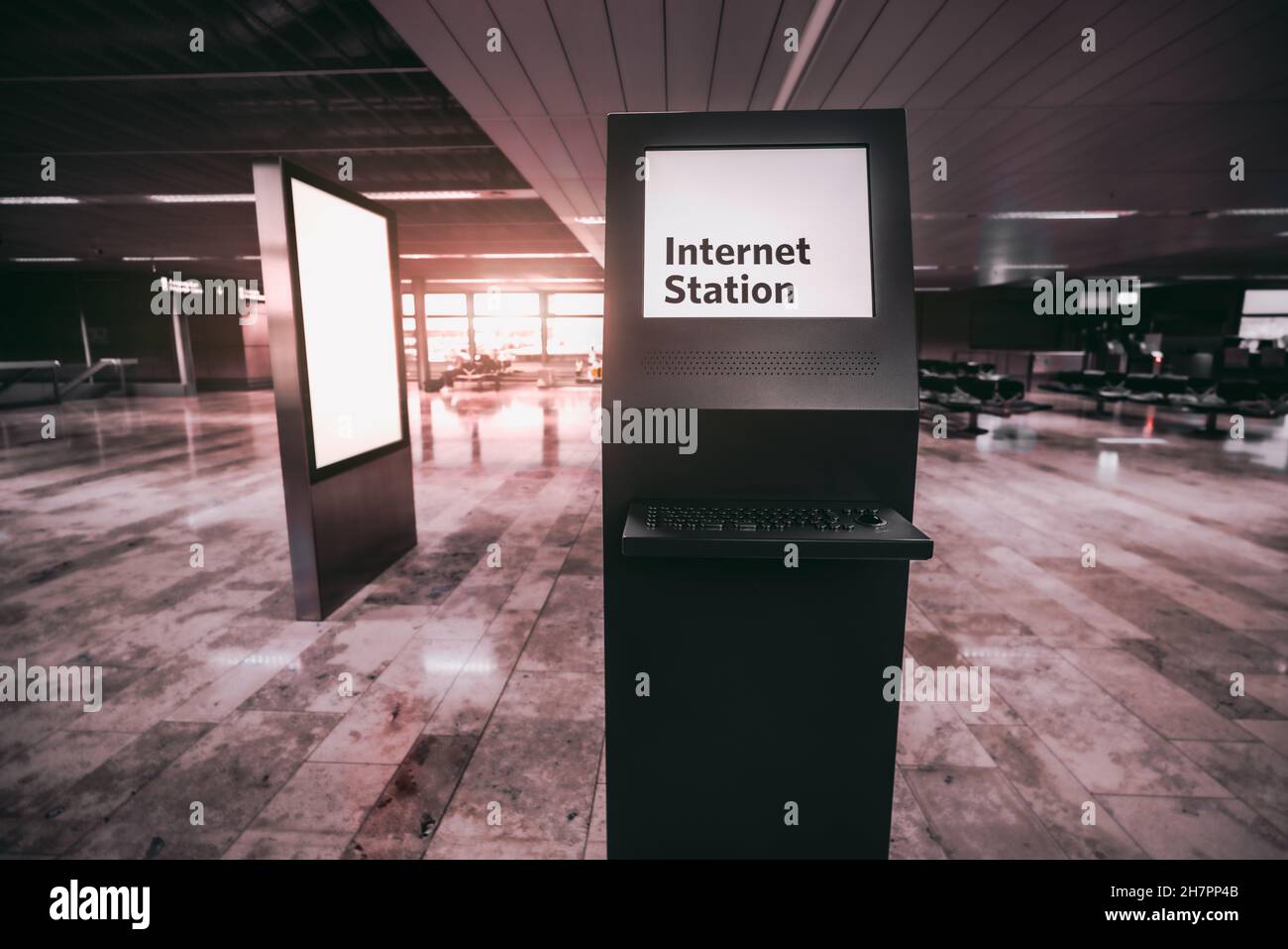 A wide-angle view of an internet station terminal mockup in a waiting ...