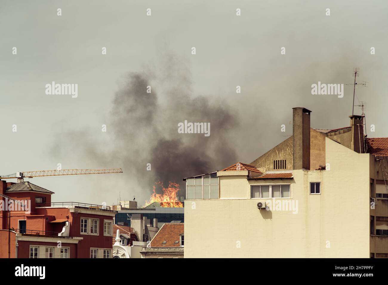 An emergency situation: a fire in a residential area of a European city ...
