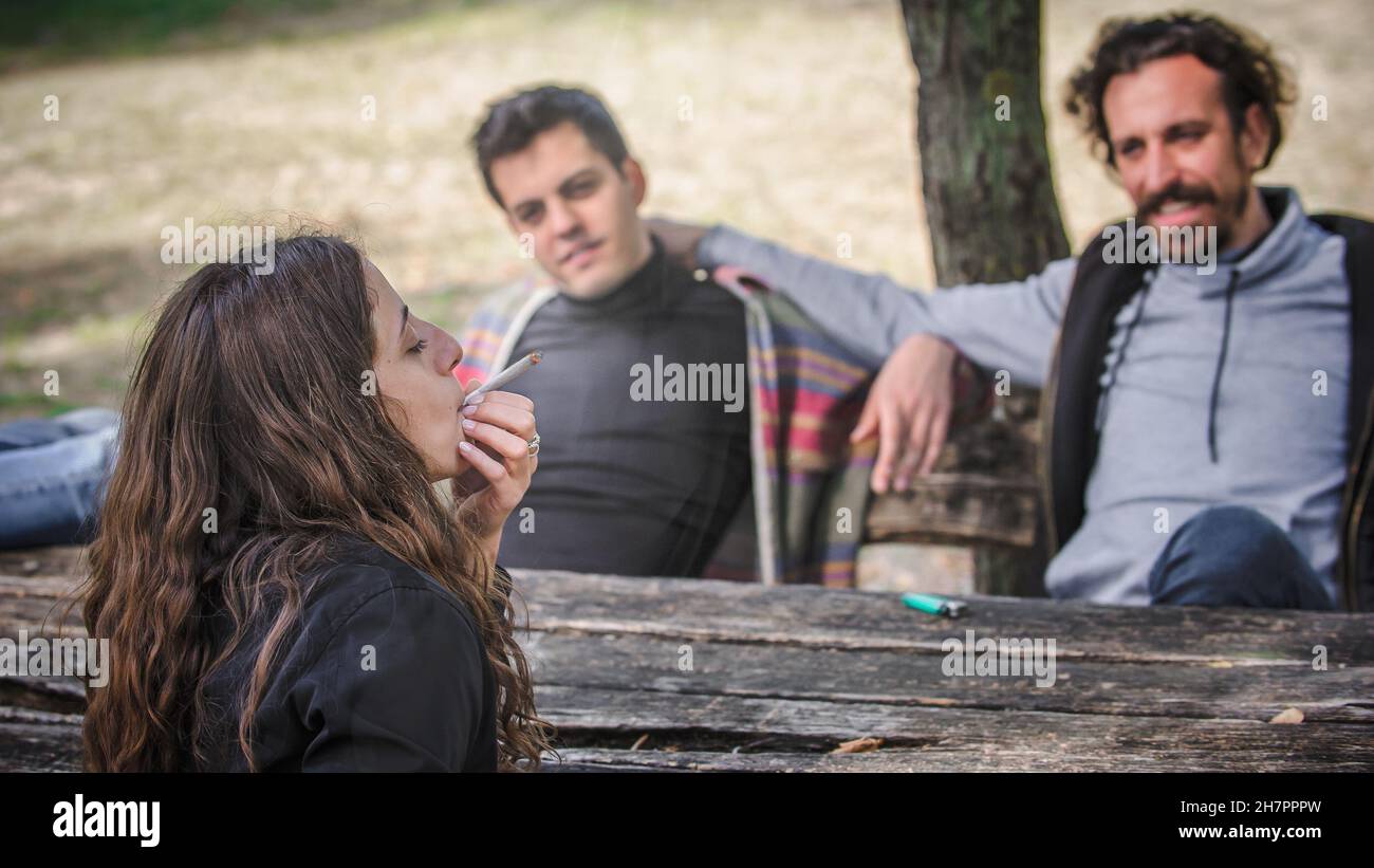 Group of relaxed and smiling happy young friends, female and male ...