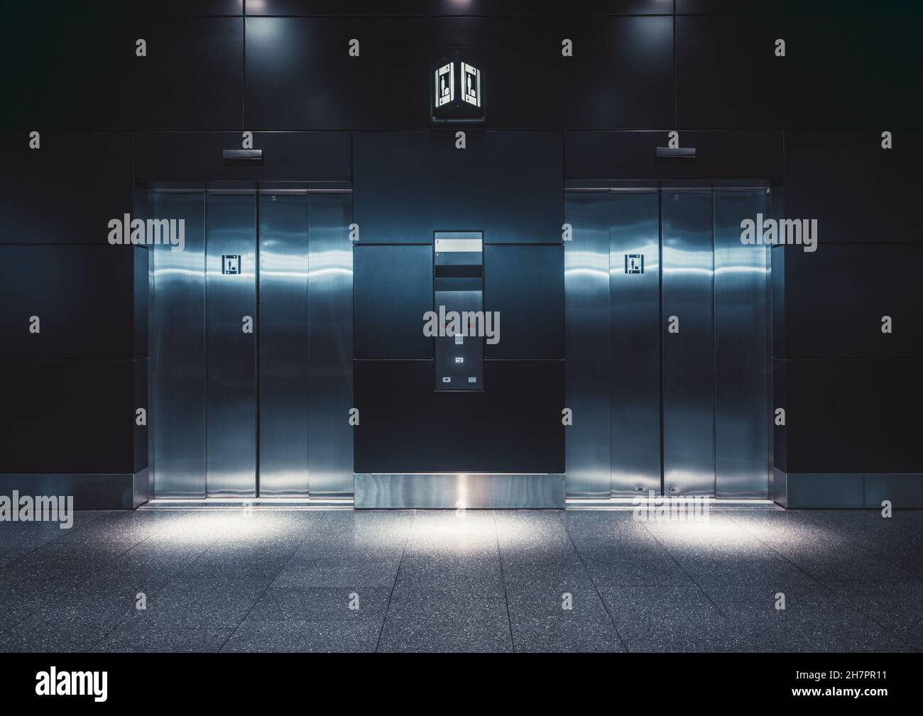 Elevator shaft in blue light hi-res stock photography and images - Alamy