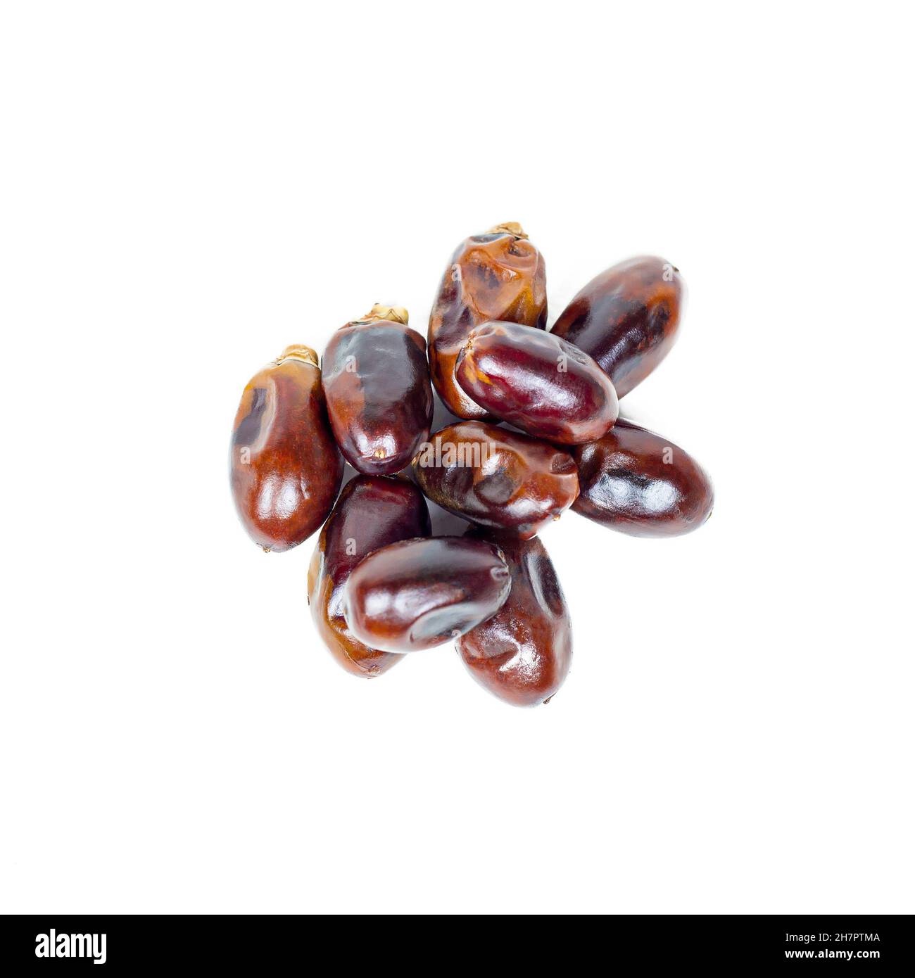 Sweet dried brown dates isolated on white background Stock Photo - Alamy