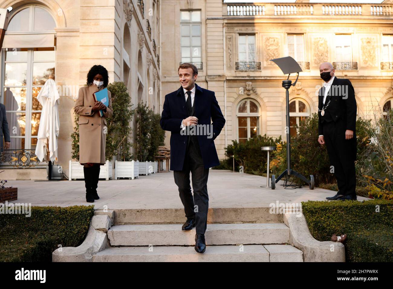 French President Emmanuel Macron (C) arrives to meet with Acadian ...