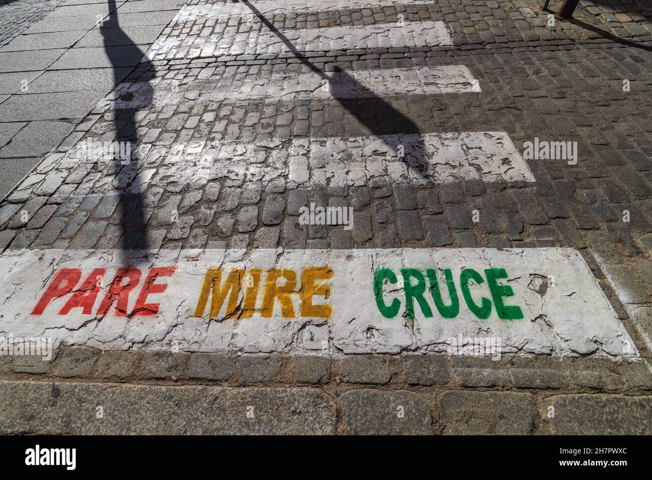 Directions at zebra crossing. Stop, look, cross Stock Photo - Alamy