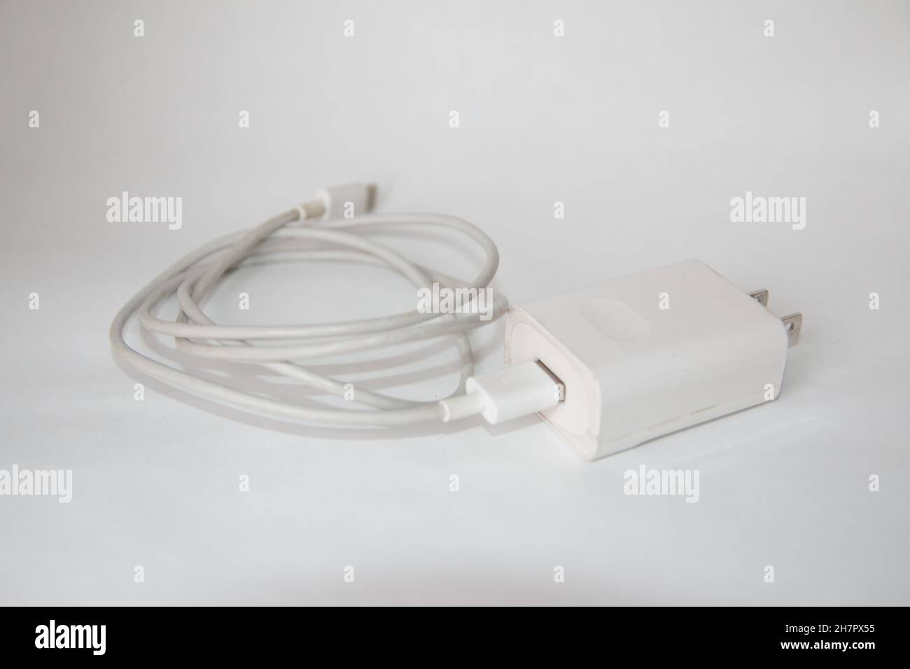 Mobile phone charger isolated on white background Stock Photo - Alamy