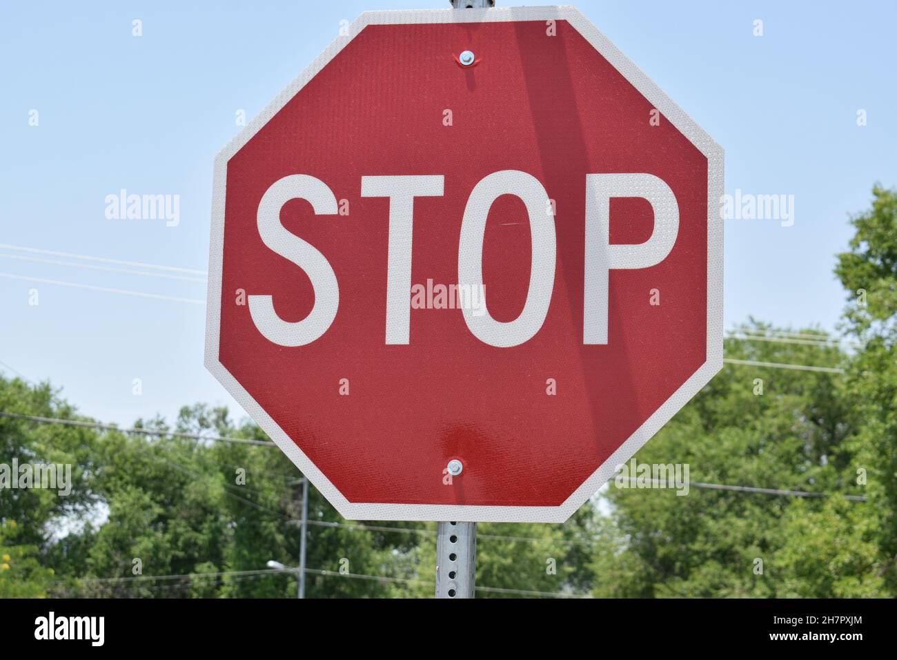 Standard Octagonal Red and White Stop Sign Stock Photo - Alamy