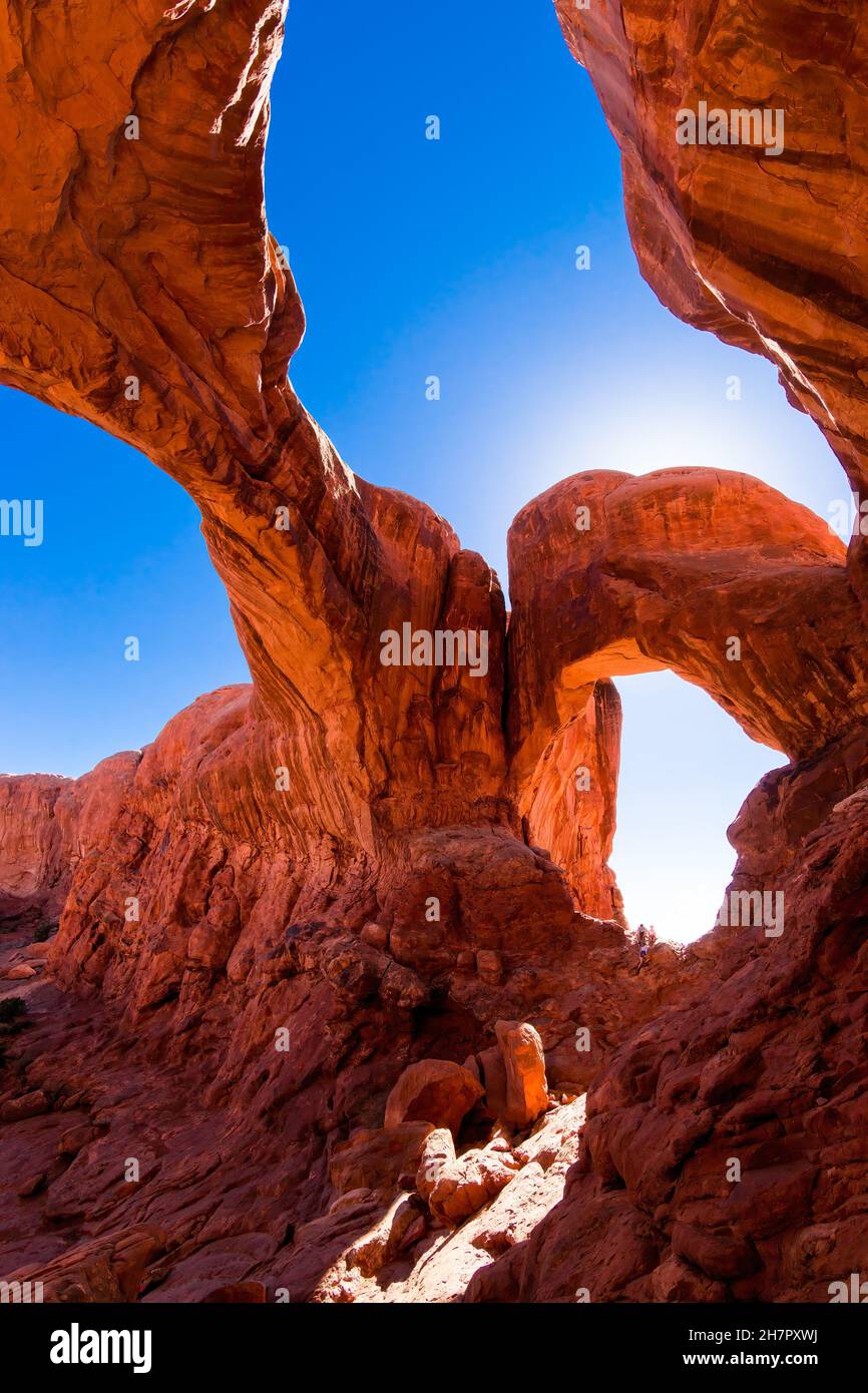 "Double Arch" with blue sky and red sandstone, Arches National Park ...