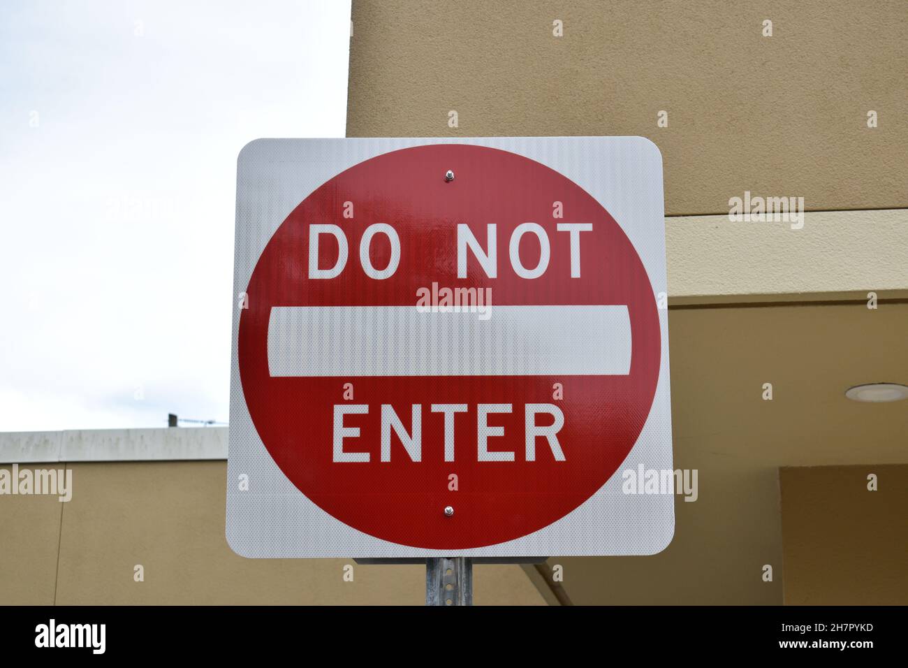 A large red and white sign says Do Not Enter Stock Photo - Alamy