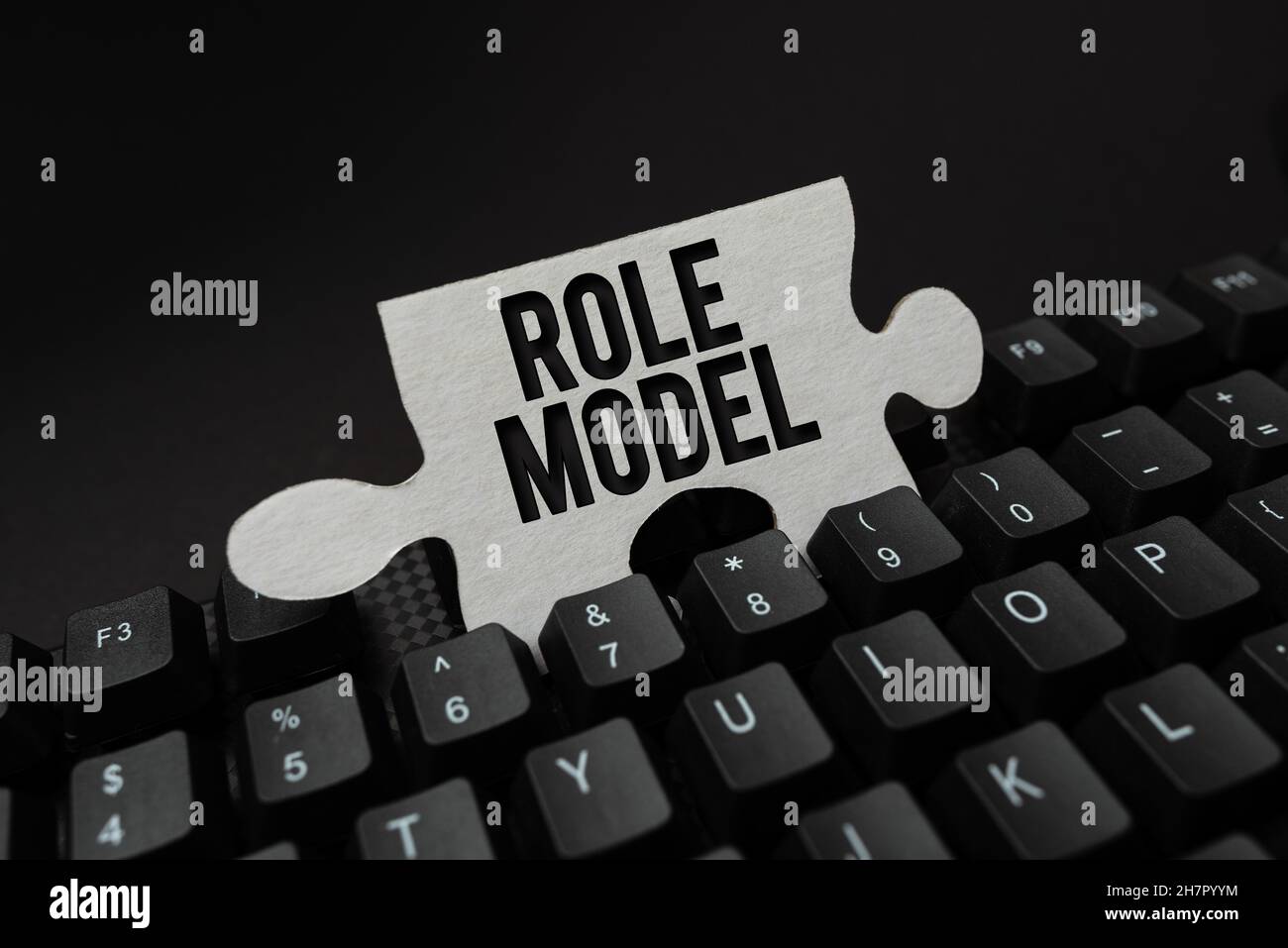 Conceptual caption Role Model. Word Written on a person looked to by ...