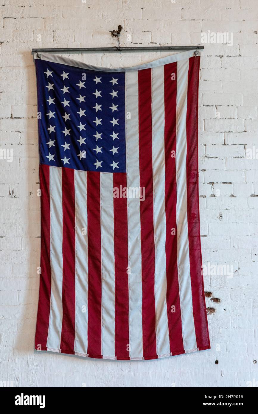 American flag hanging on wall hi-res stock photography and images - Alamy