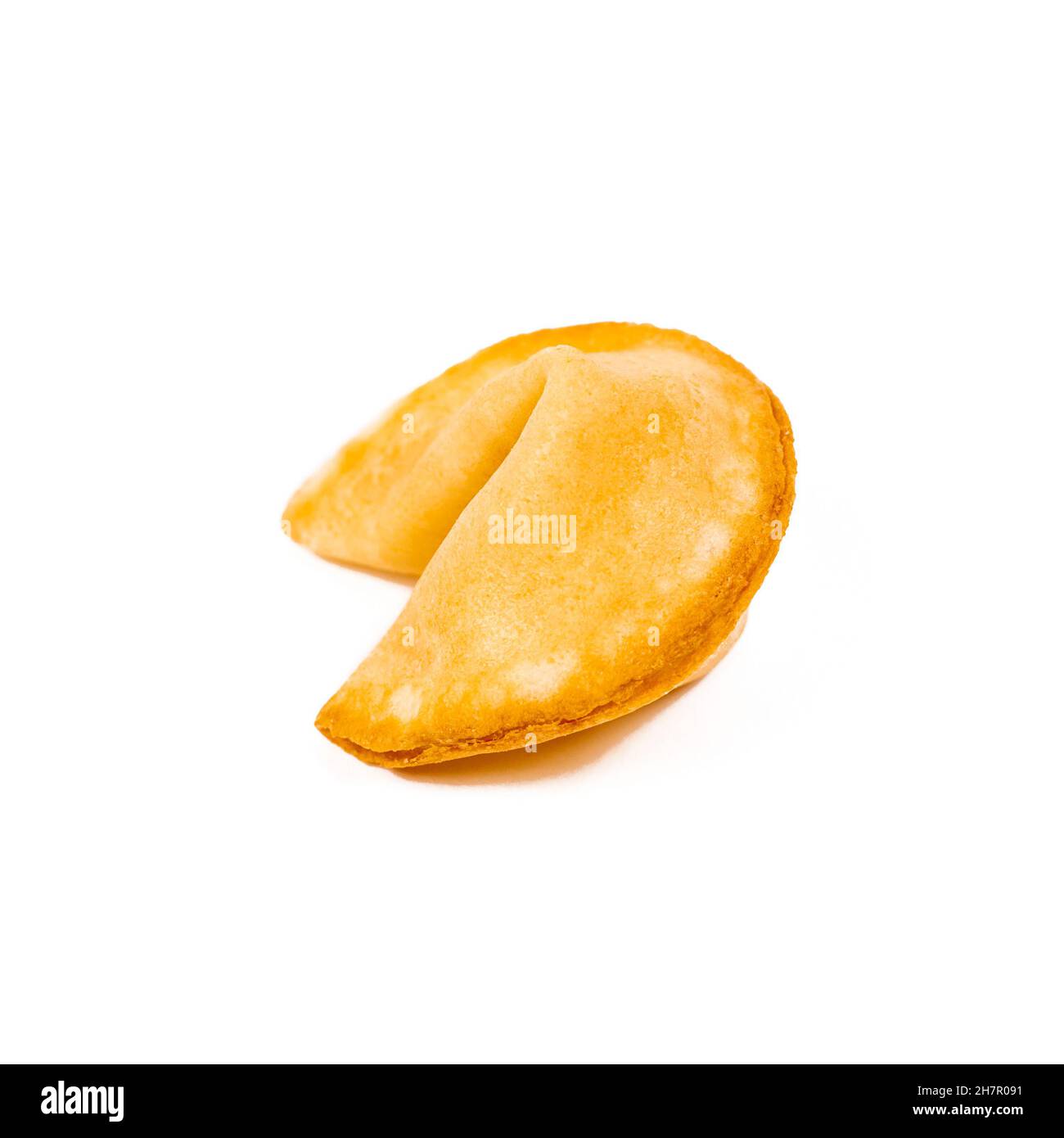 Fresh baked yellow Chinese fortune cookies isolated on white background ...