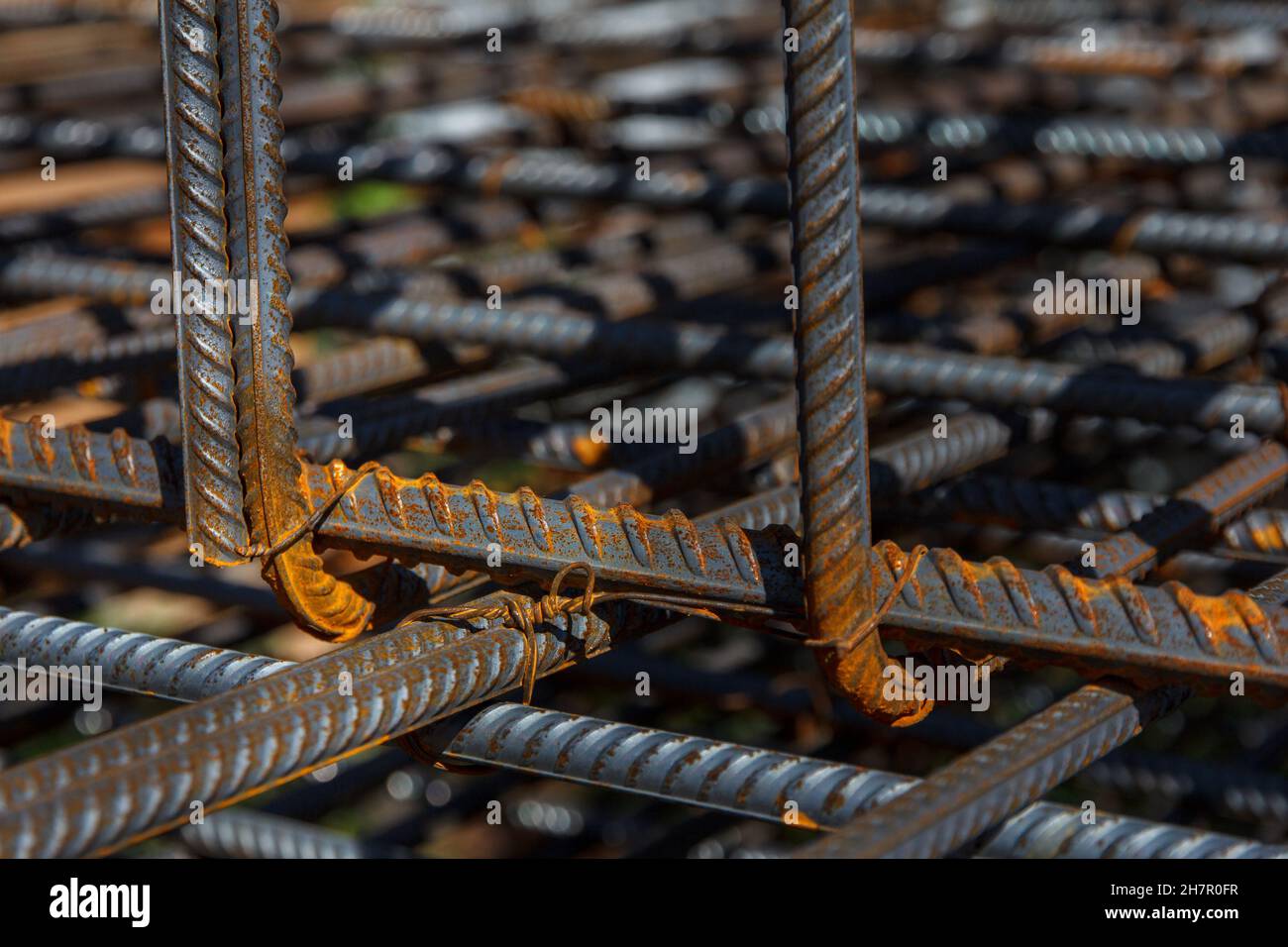 Stacked steel rods for concreting. Preparation of the base for the ...
