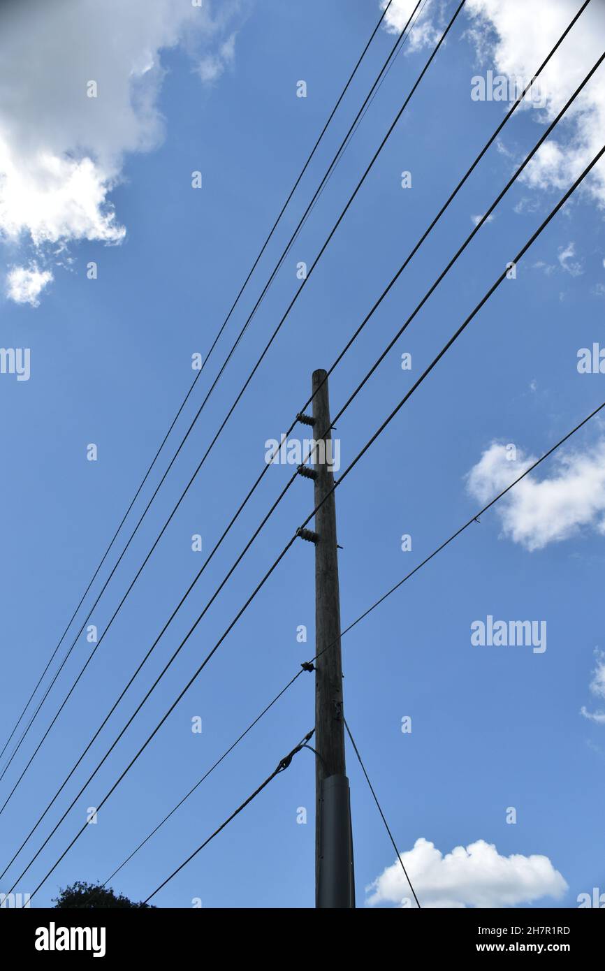 Parallel wires stretch over a utility pole Stock Photo - Alamy