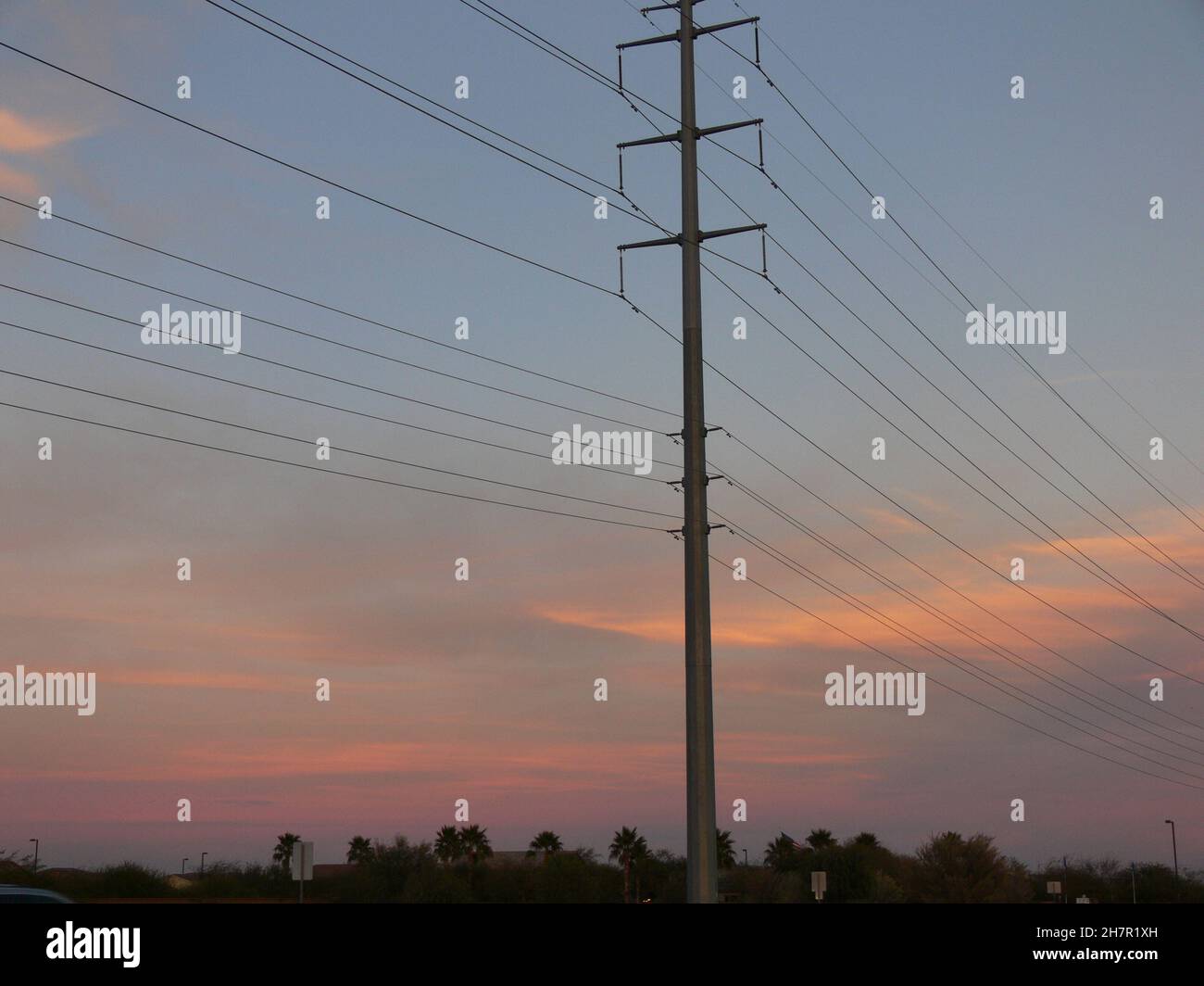 High voltage powerlines traverse a beautiful sunset in Arizona Stock Photo - Alamy