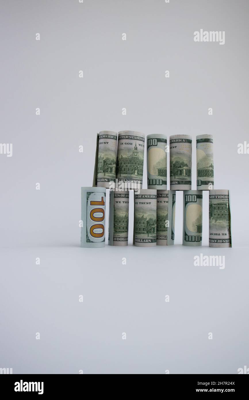 The construction from 100 dollars banknotes. Money construction Stock ...