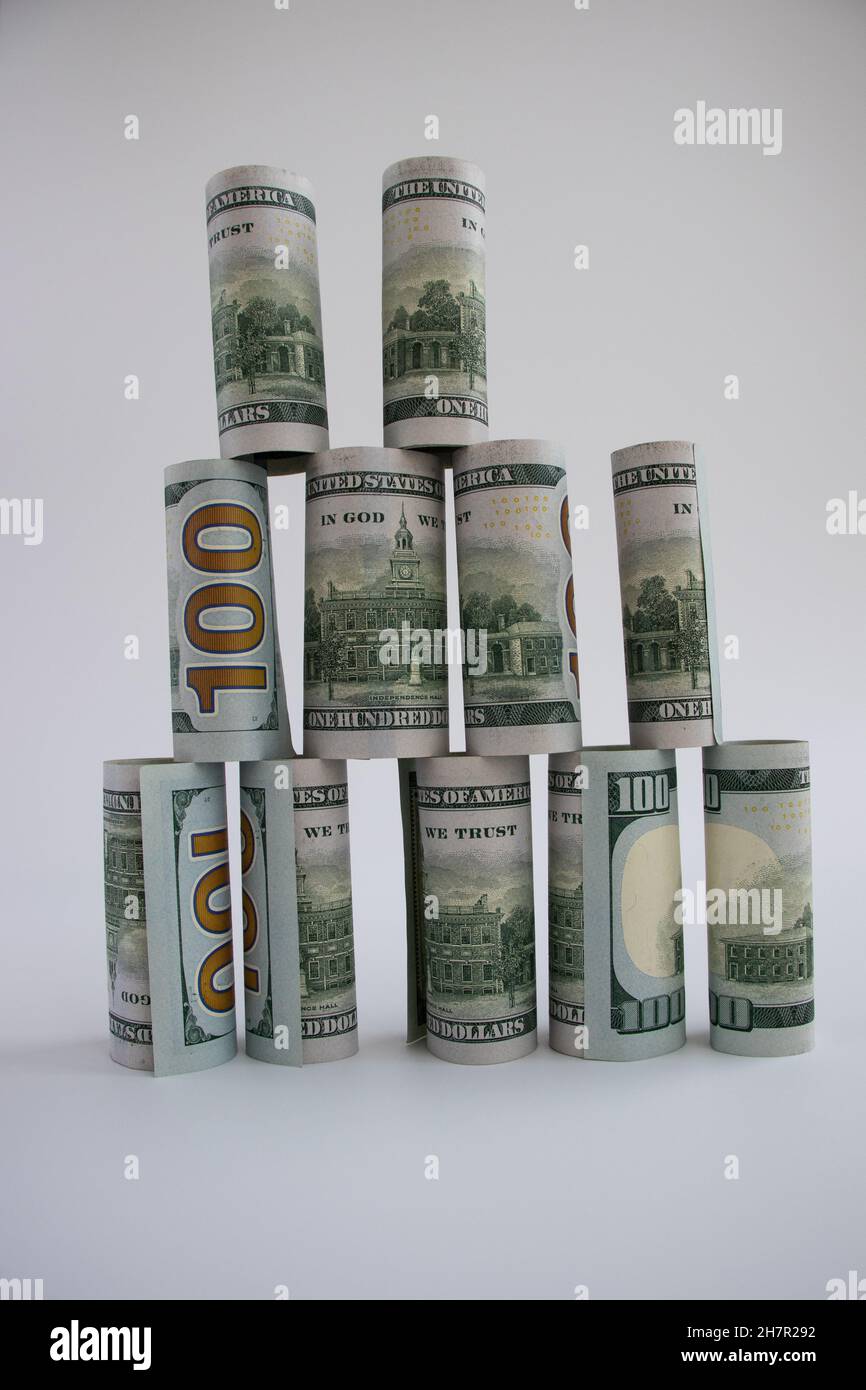 The construction from 100 dollars banknotes. Money construction Stock ...