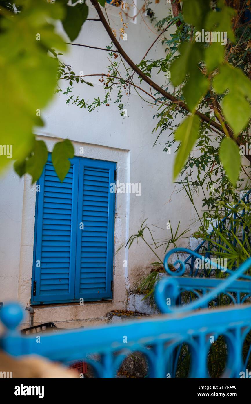 greece architecture white wall and blue window Stock Photo - Alamy