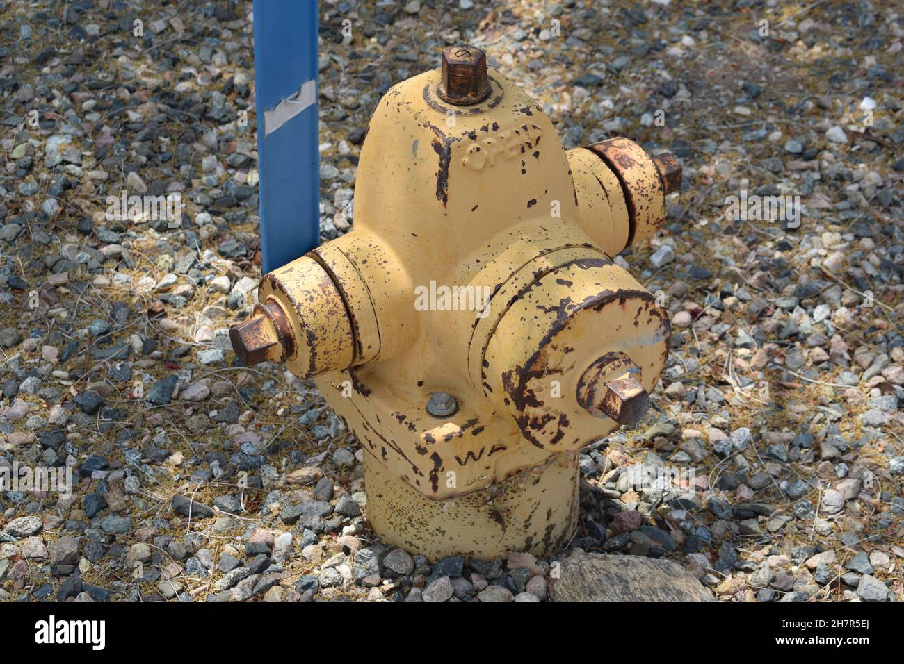 Angled view of old rusted yellow fire hydrant Stock Photo - Alamy