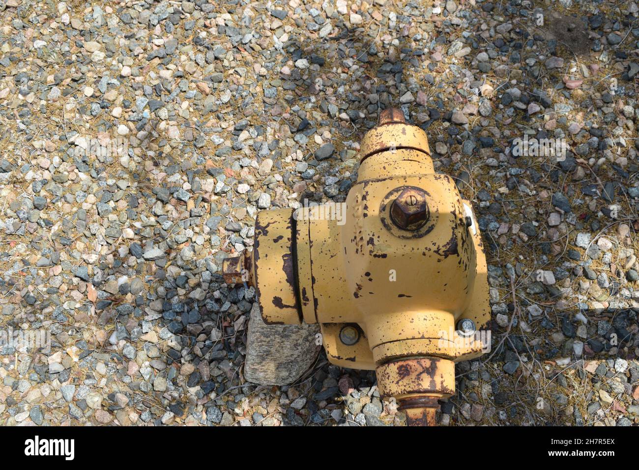 Top view of old rusted yellow fire hydrant Stock Photo - Alamy