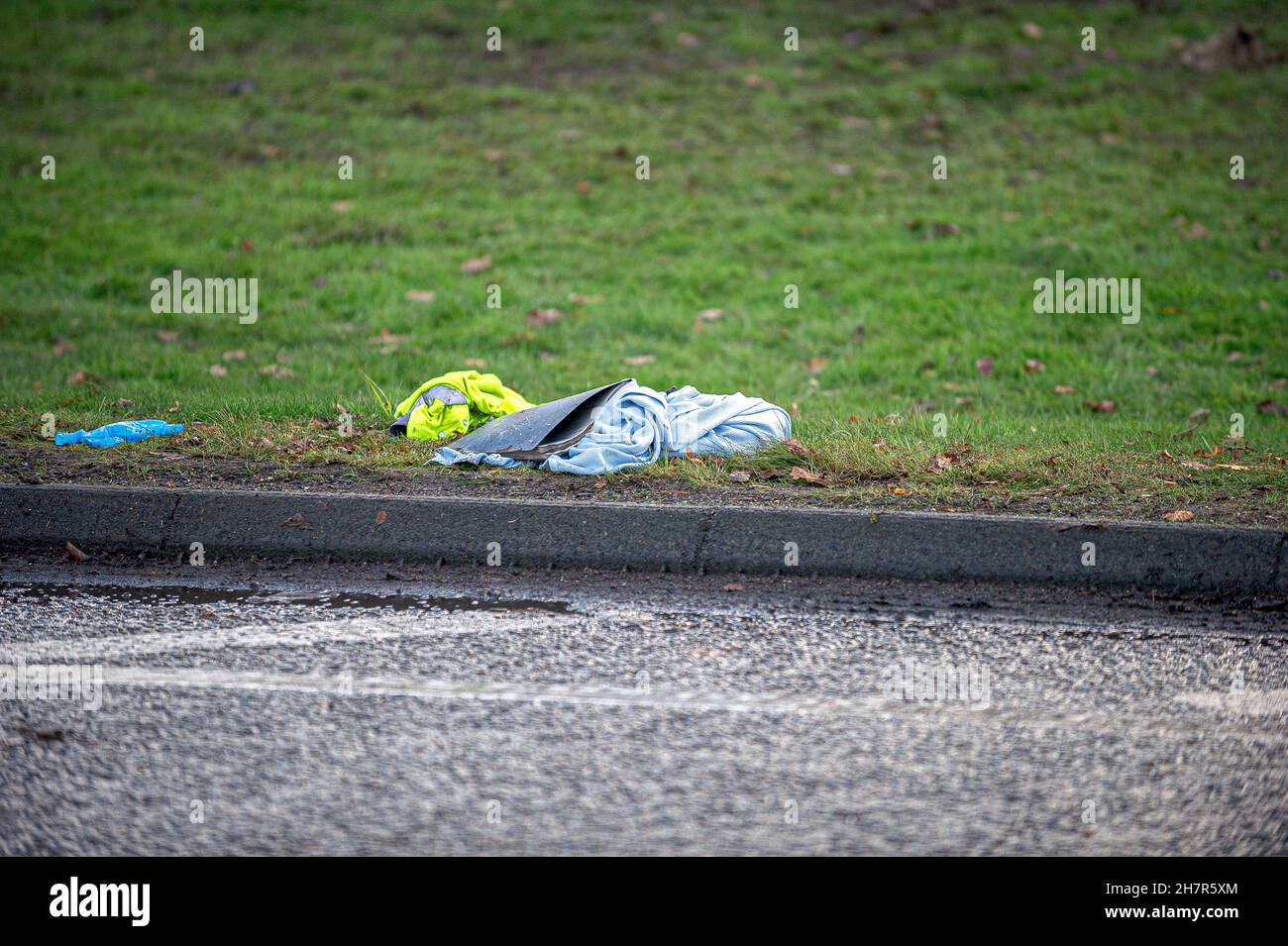 Clothing that was thrown from the wreckage is seen outside the wreck.At ...