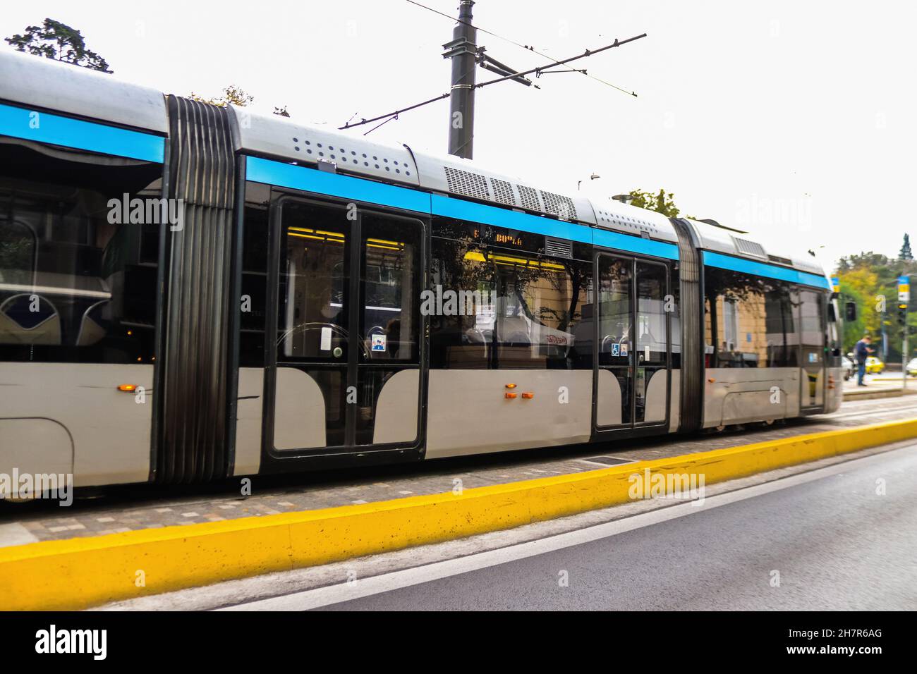 Athens, Greece - November 22, 2021 Modern electric tram for passengers ...