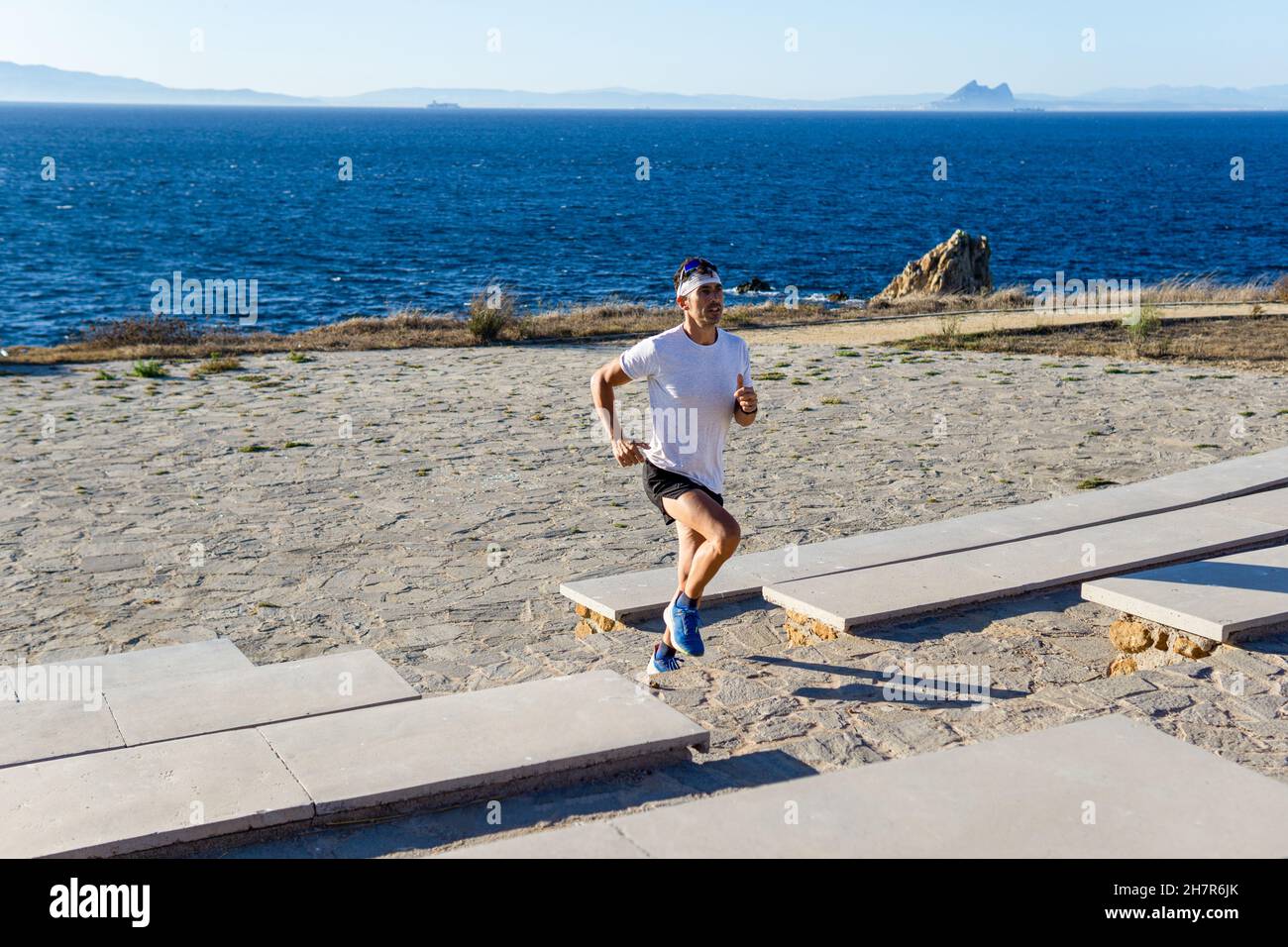 Young man running stairs in hi-res stock photography and images - Alamy