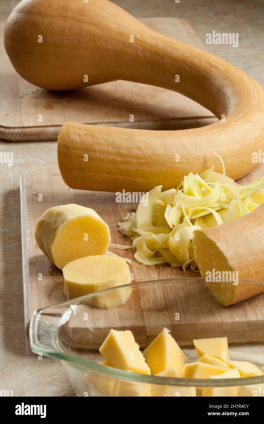 Preparing a Tromboncino squash to cook Stock Photo - Alamy
