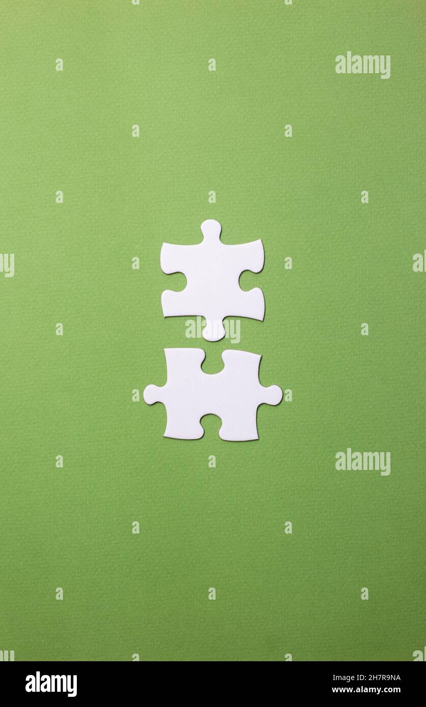 two pieces of a puzzle represent the compatibility between two people ...